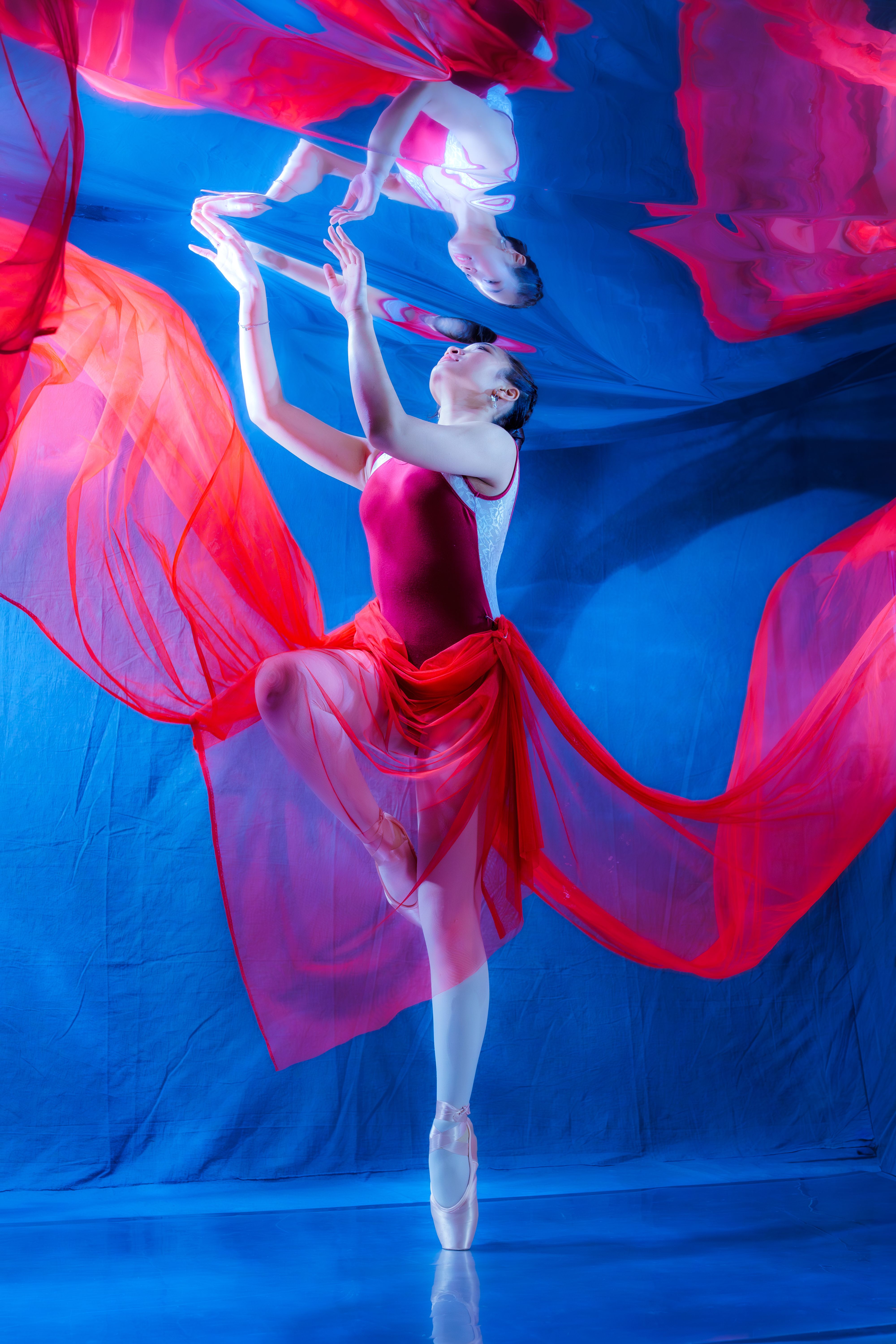 Underwater Ballet Dancer in Flowing Red Dress · Free Stock Photo