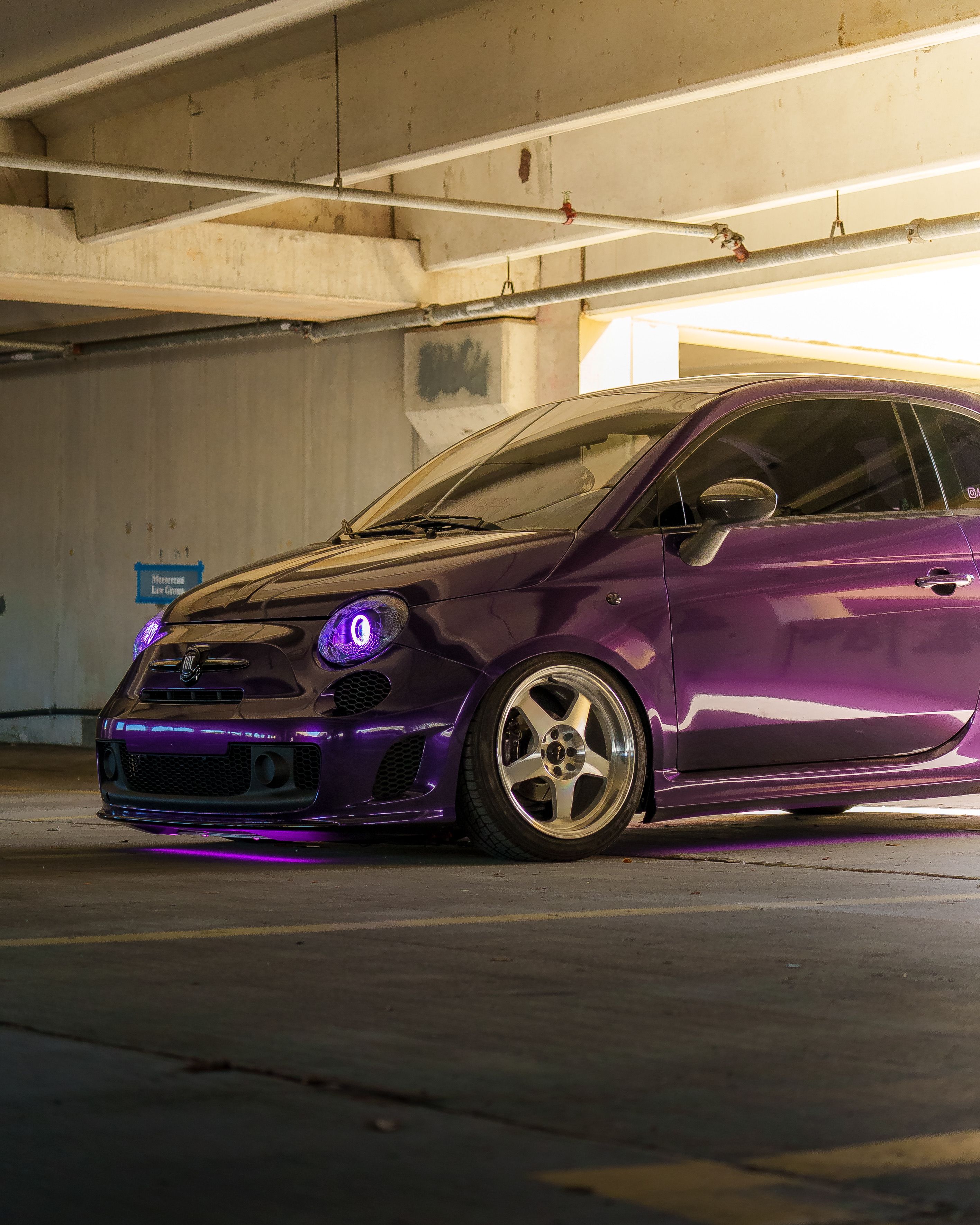Purple Custom Car in Urban Parking Garage · Free Stock Photo