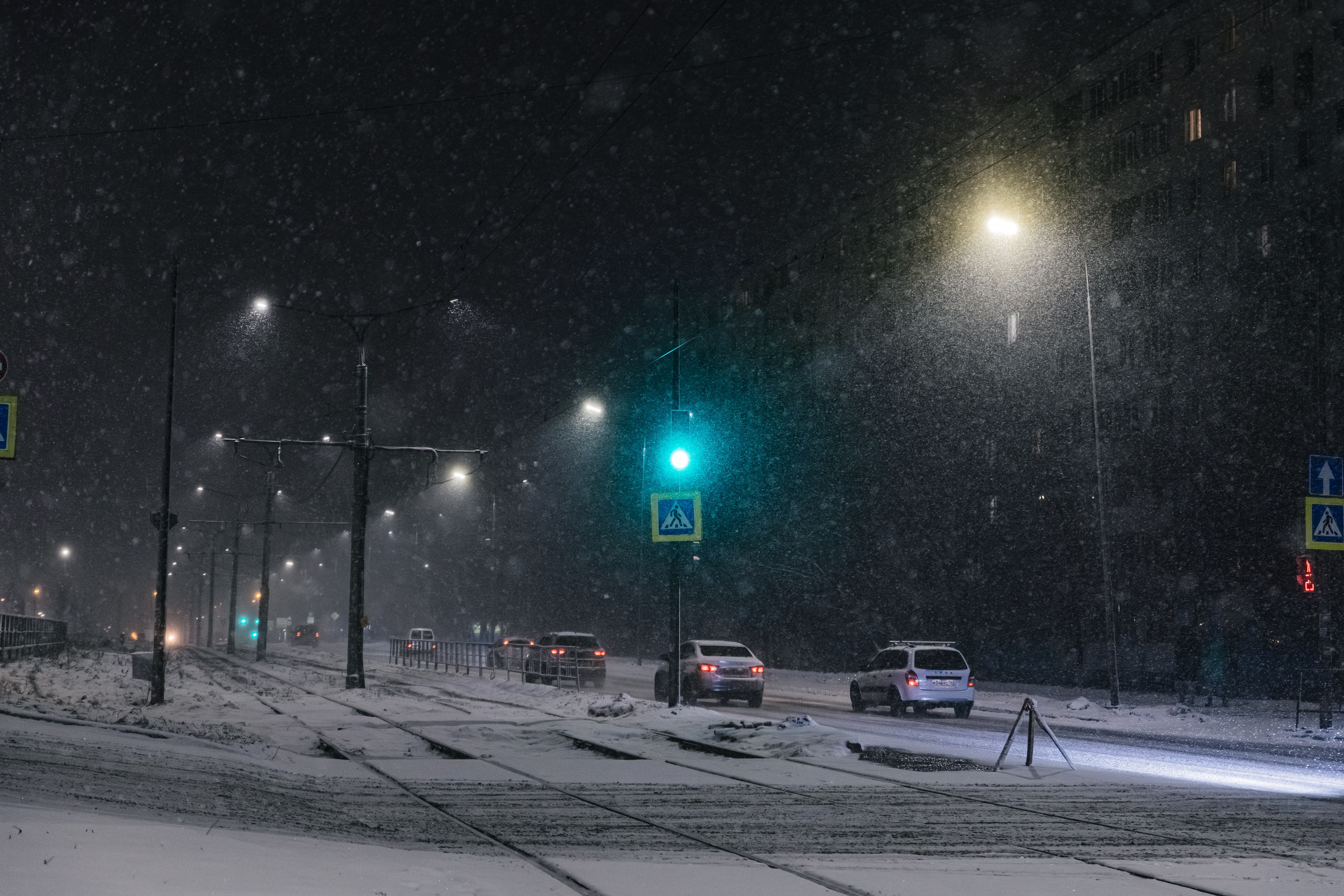 Snowy Night City Street with Traffic Lights · Free Stock Photo