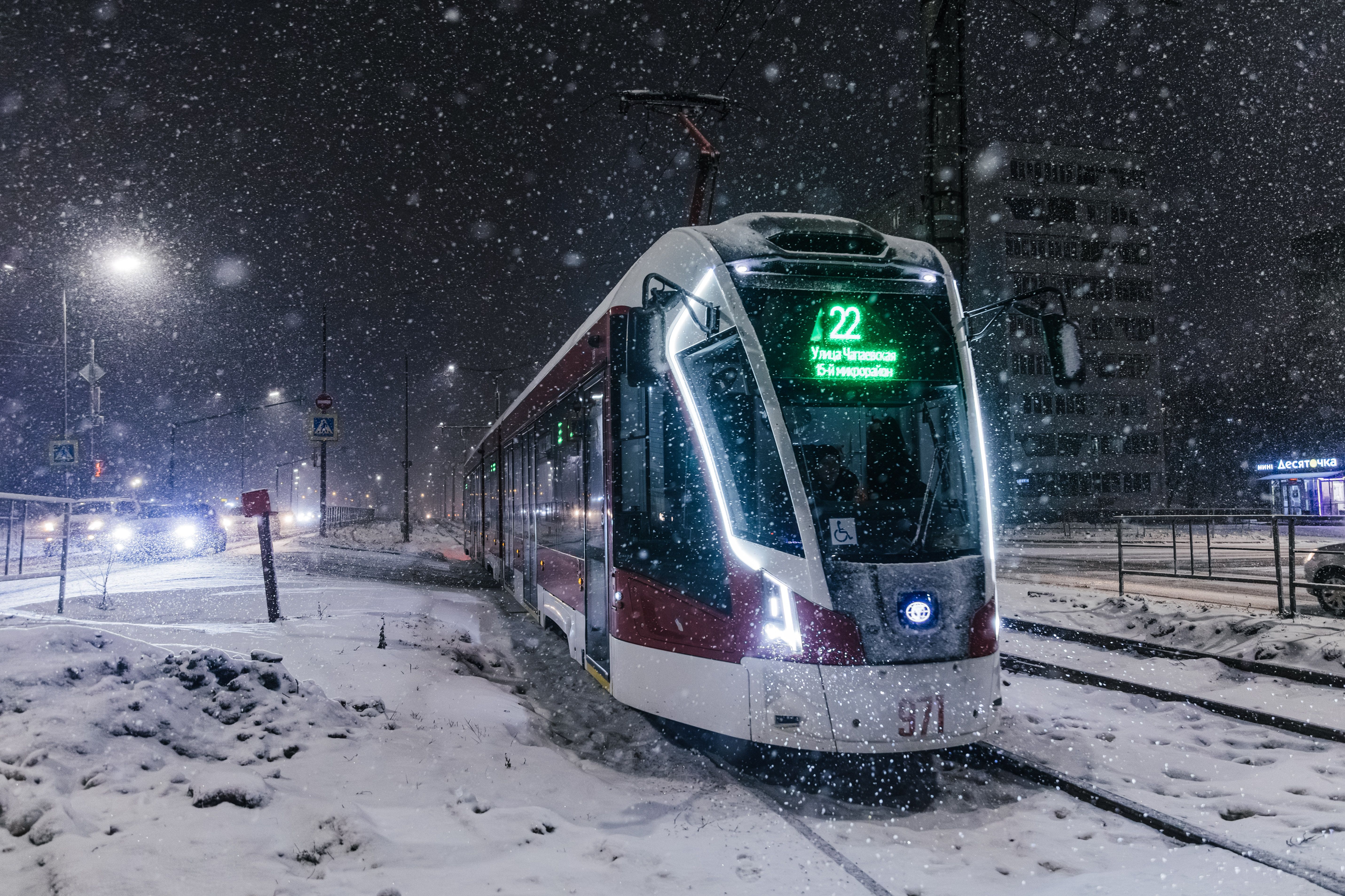 Snowy Night Tram in Urban Winter Landscape · Free Stock Photo