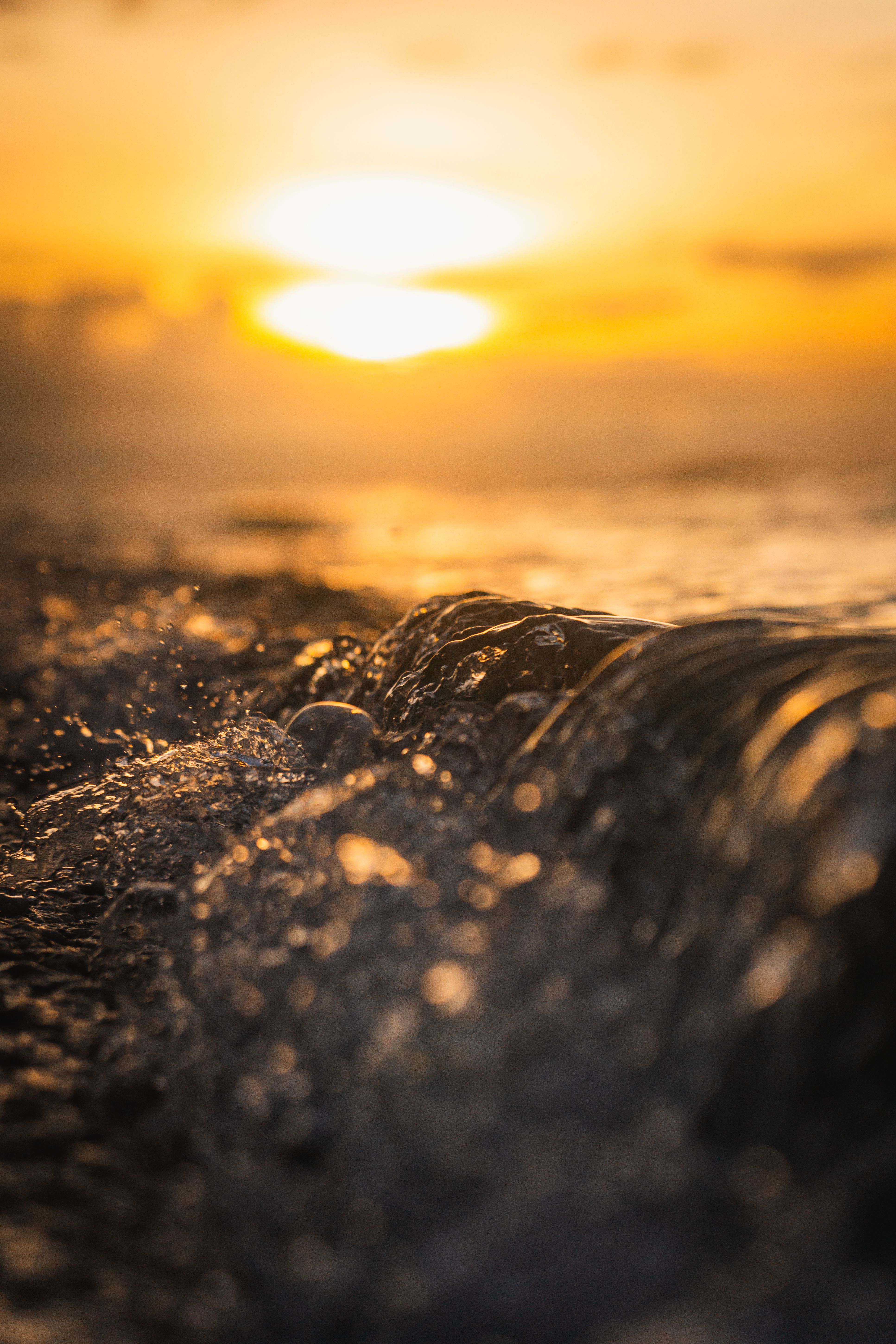 Golden Sunset Over Ocean Waves · Free Stock Photo