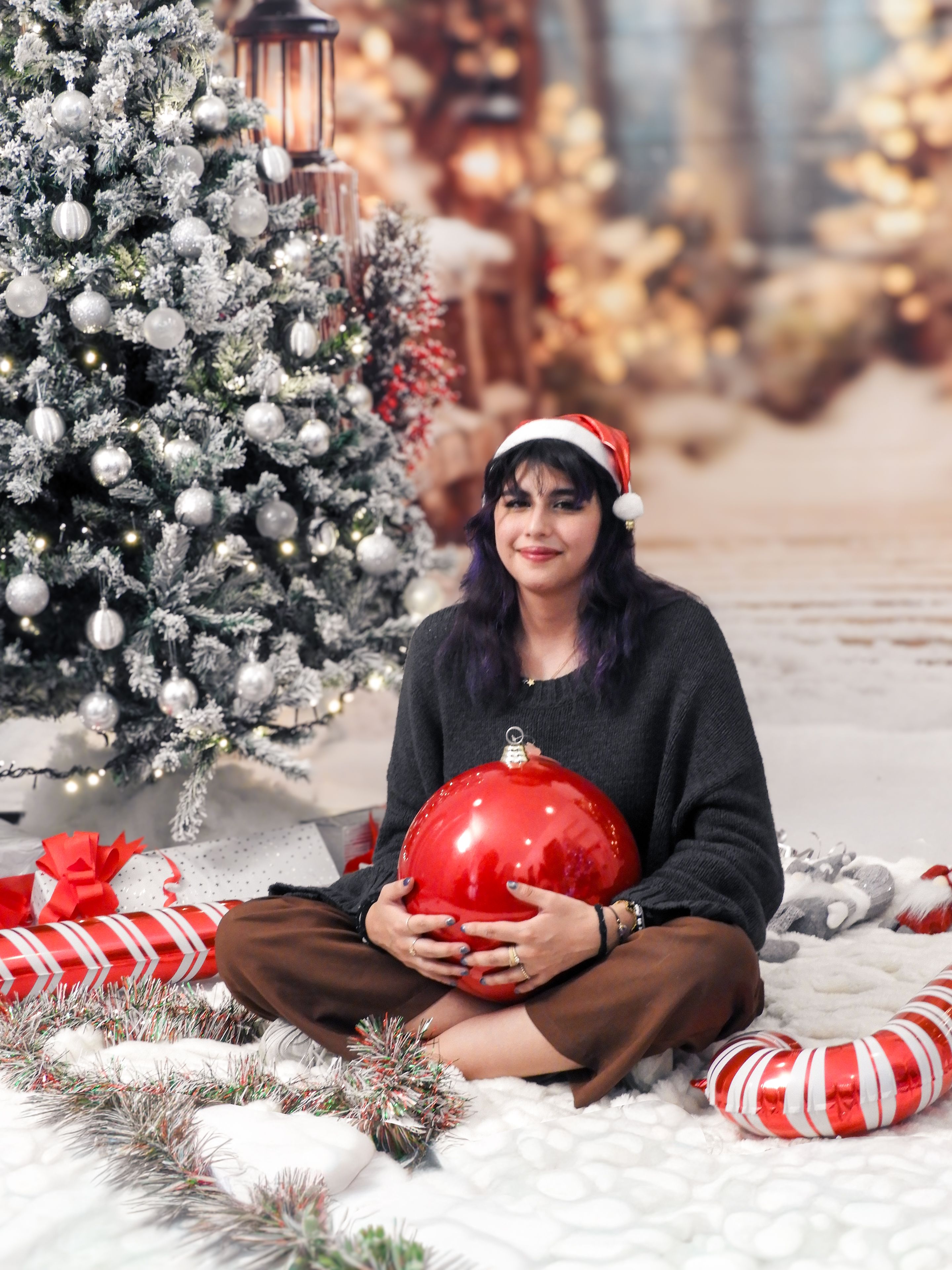 Festive Christmas Portrait with Ornament · Free Stock Photo