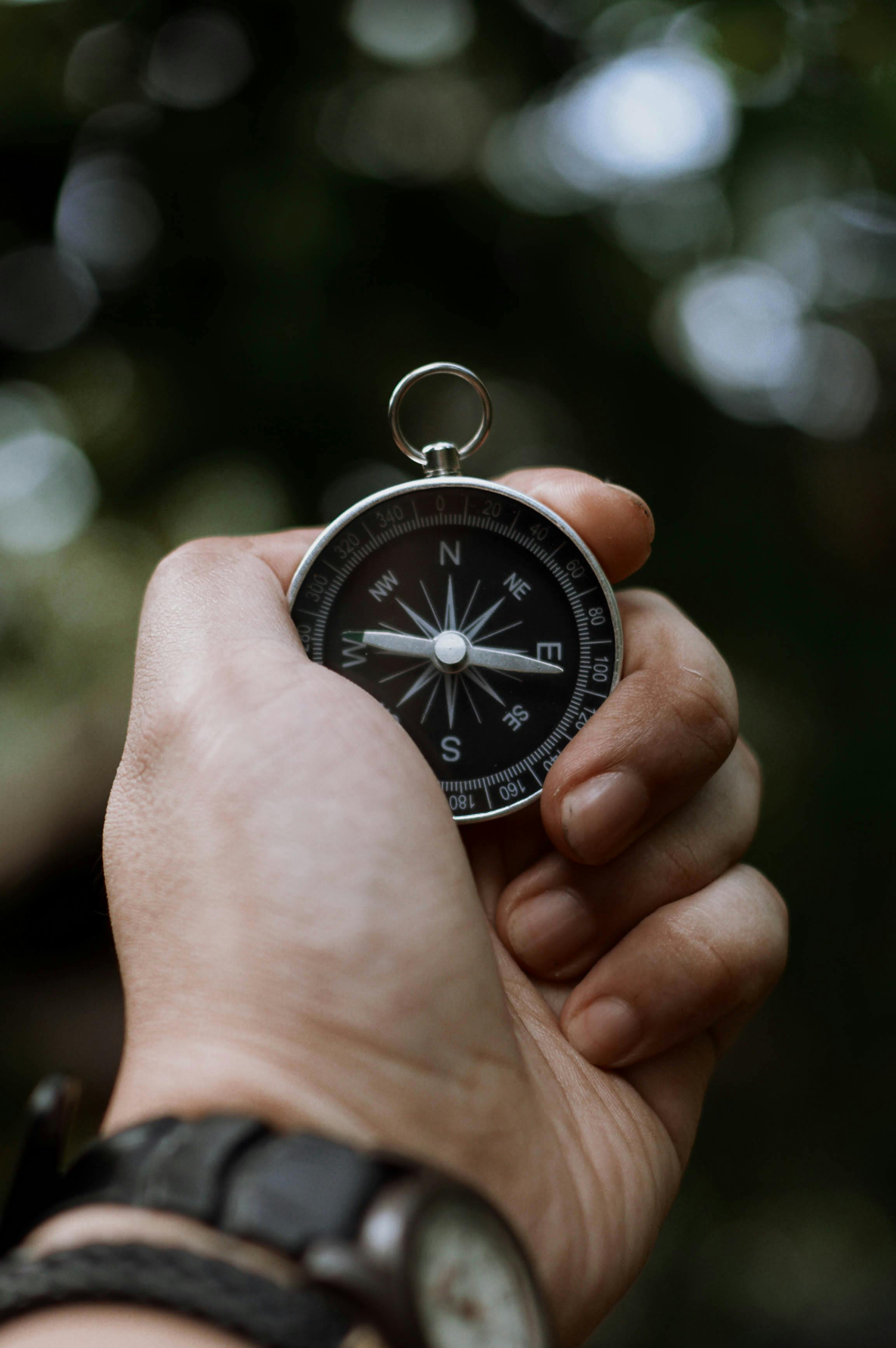 Person Holding Compass · Free Stock Photo