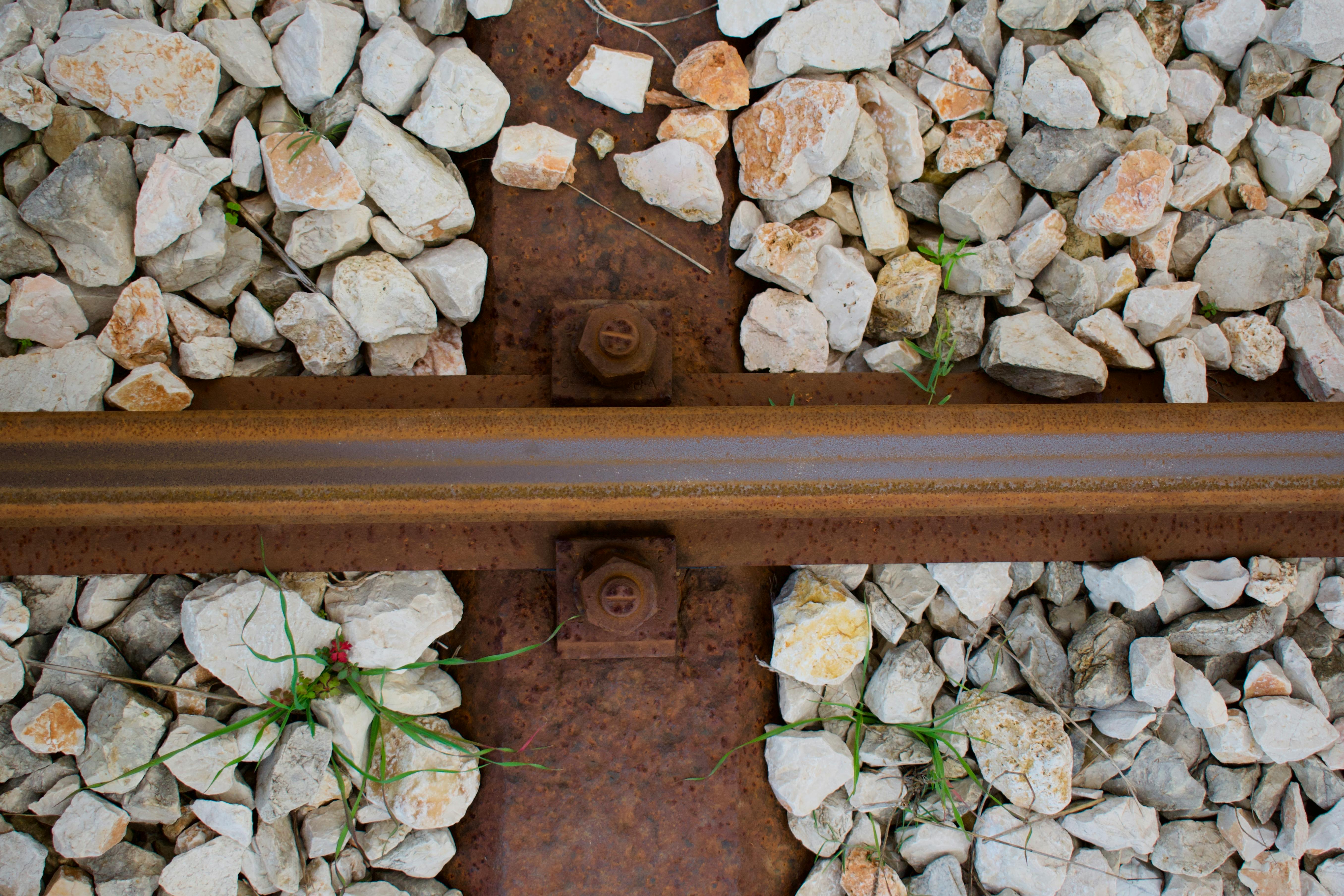 Close-up of Railway Track with Gravel · Free Stock Photo