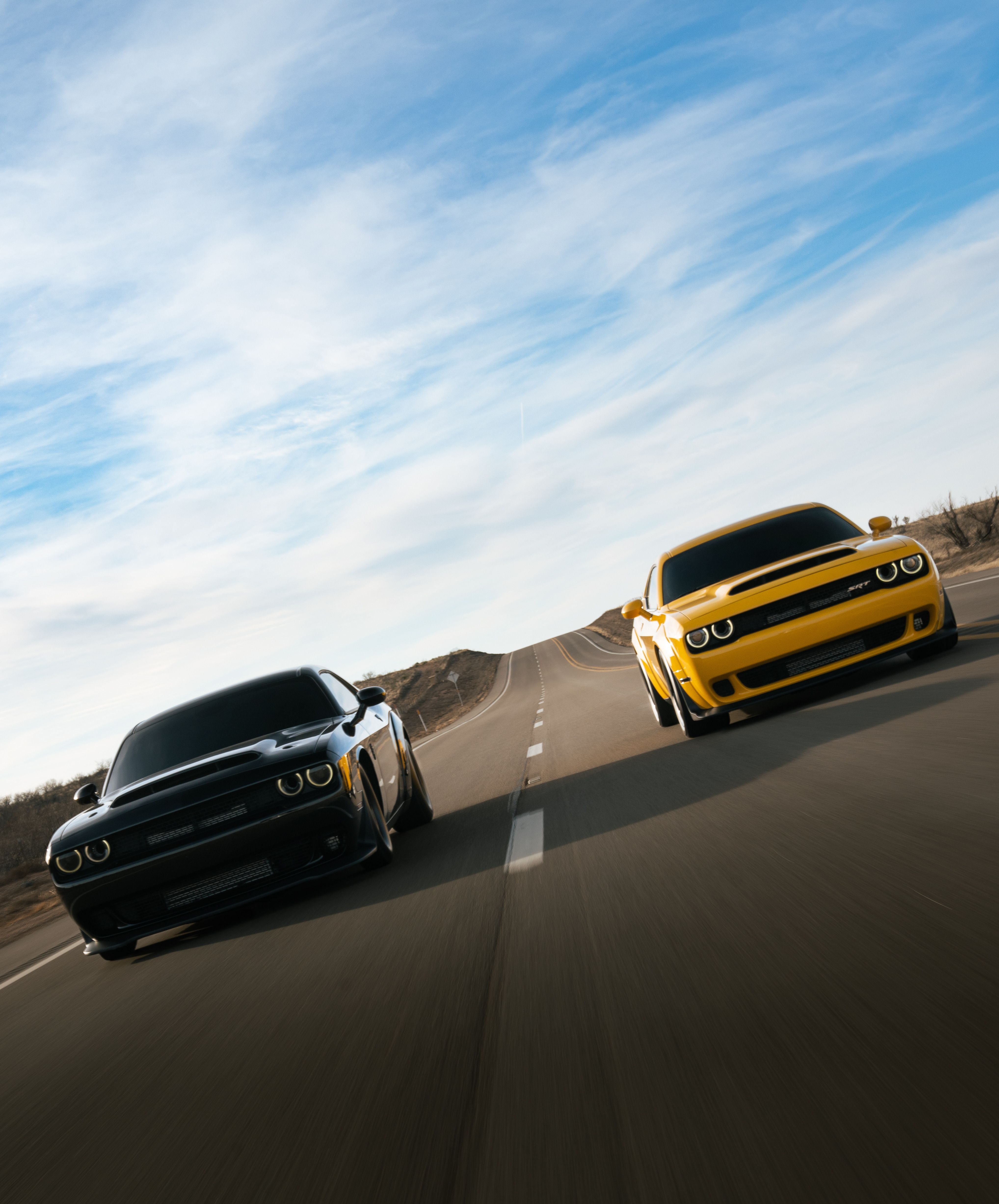 Two Dodge Challengers in Urban Setting · Free Stock Photo