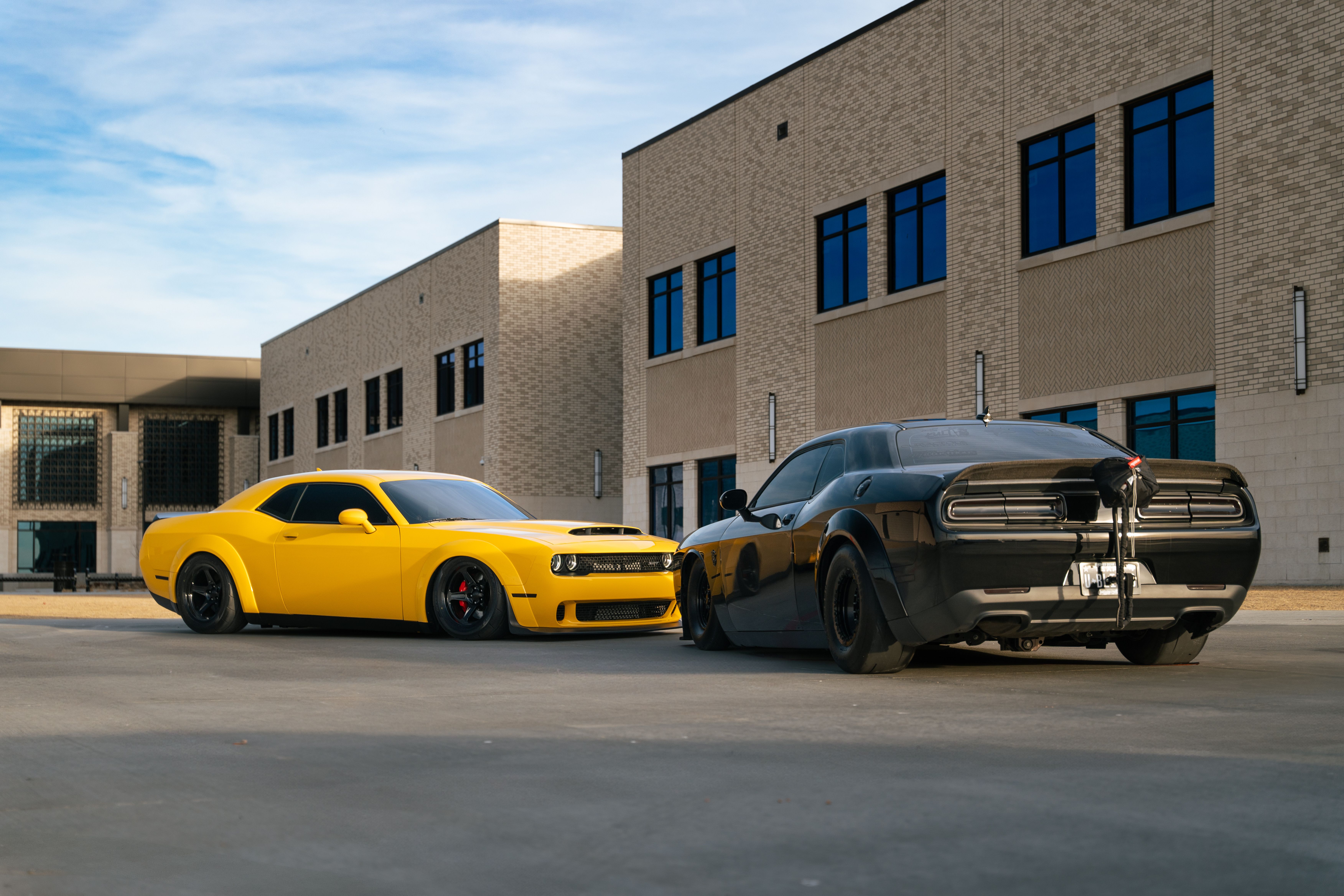 Two Dodge Challengers in Urban Setting · Free Stock Photo