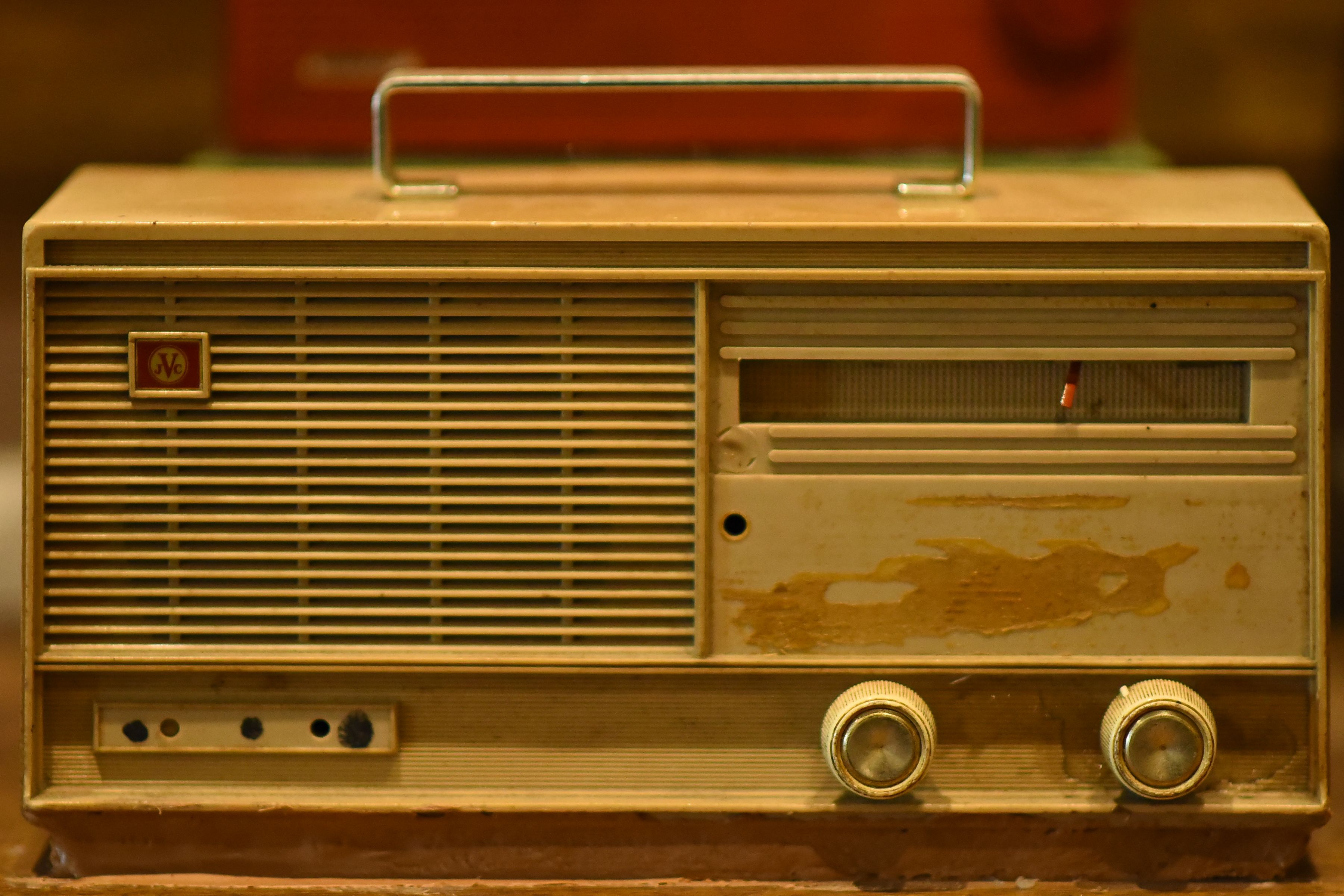 Vintage Radio with Worn Texture and Dial Display · Free Stock Photo