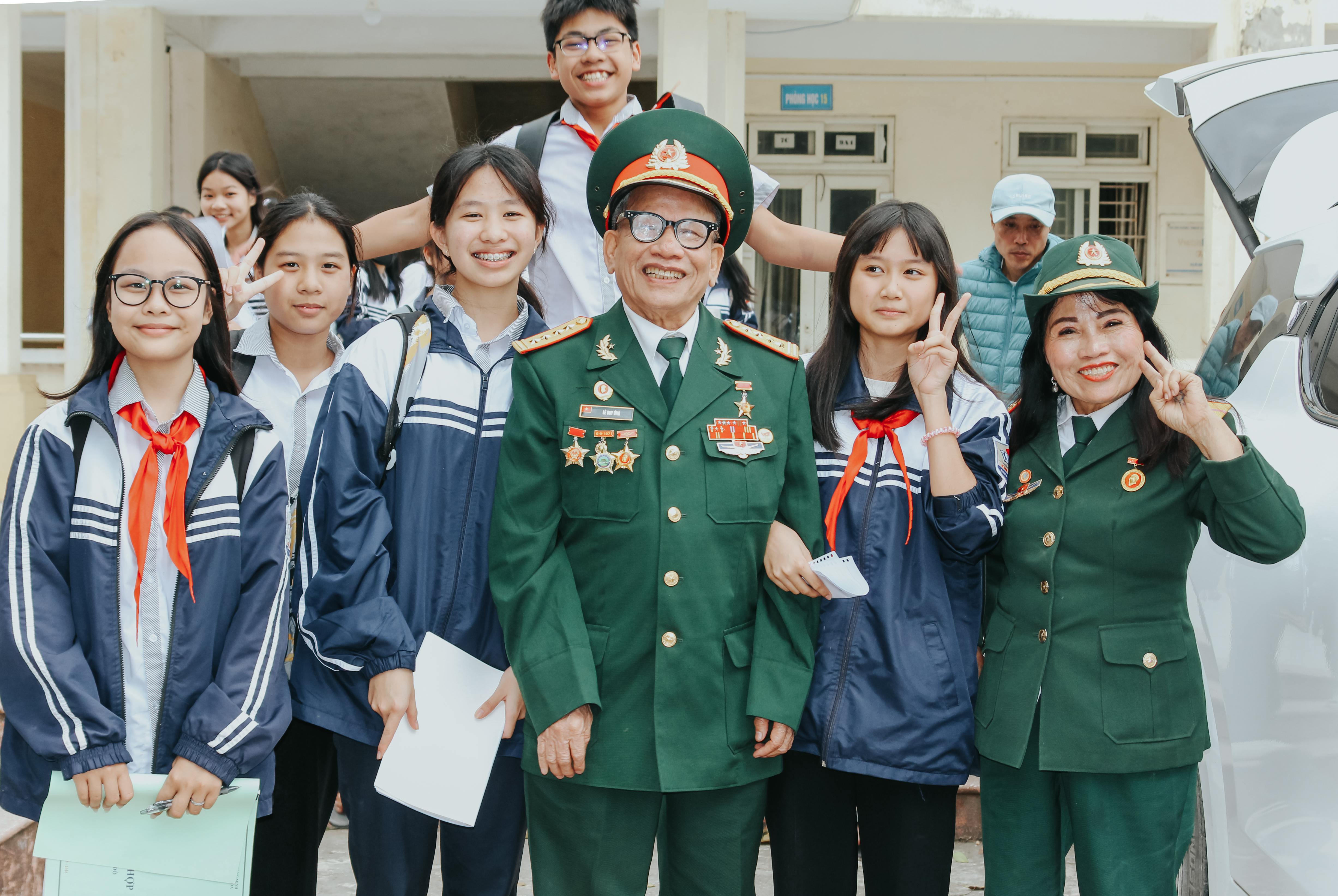 Group of Students with Military Veterans on School Visit · Free Stock Photo