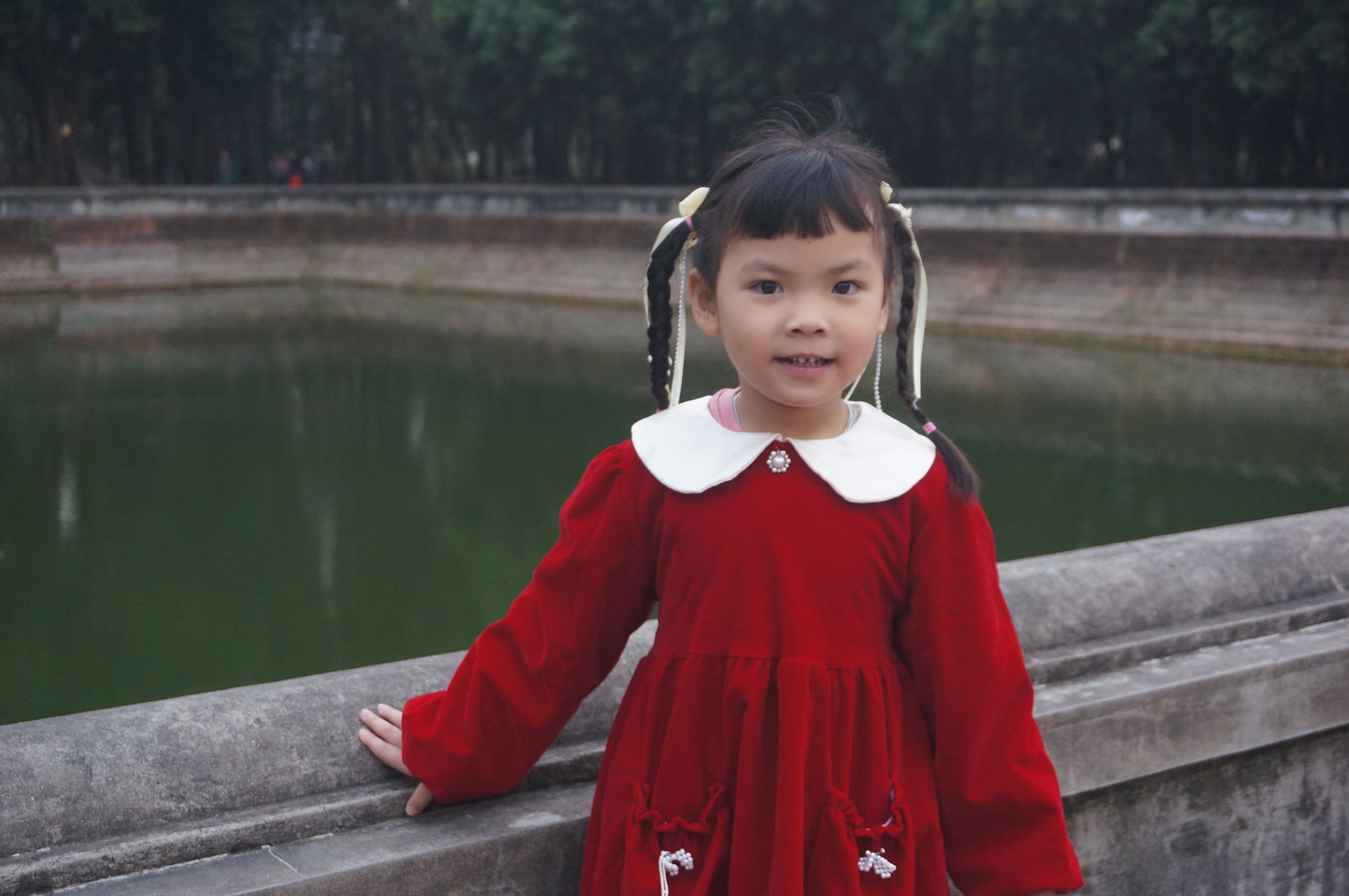 Child in Red Dress by Serene Pond · Free Stock Photo