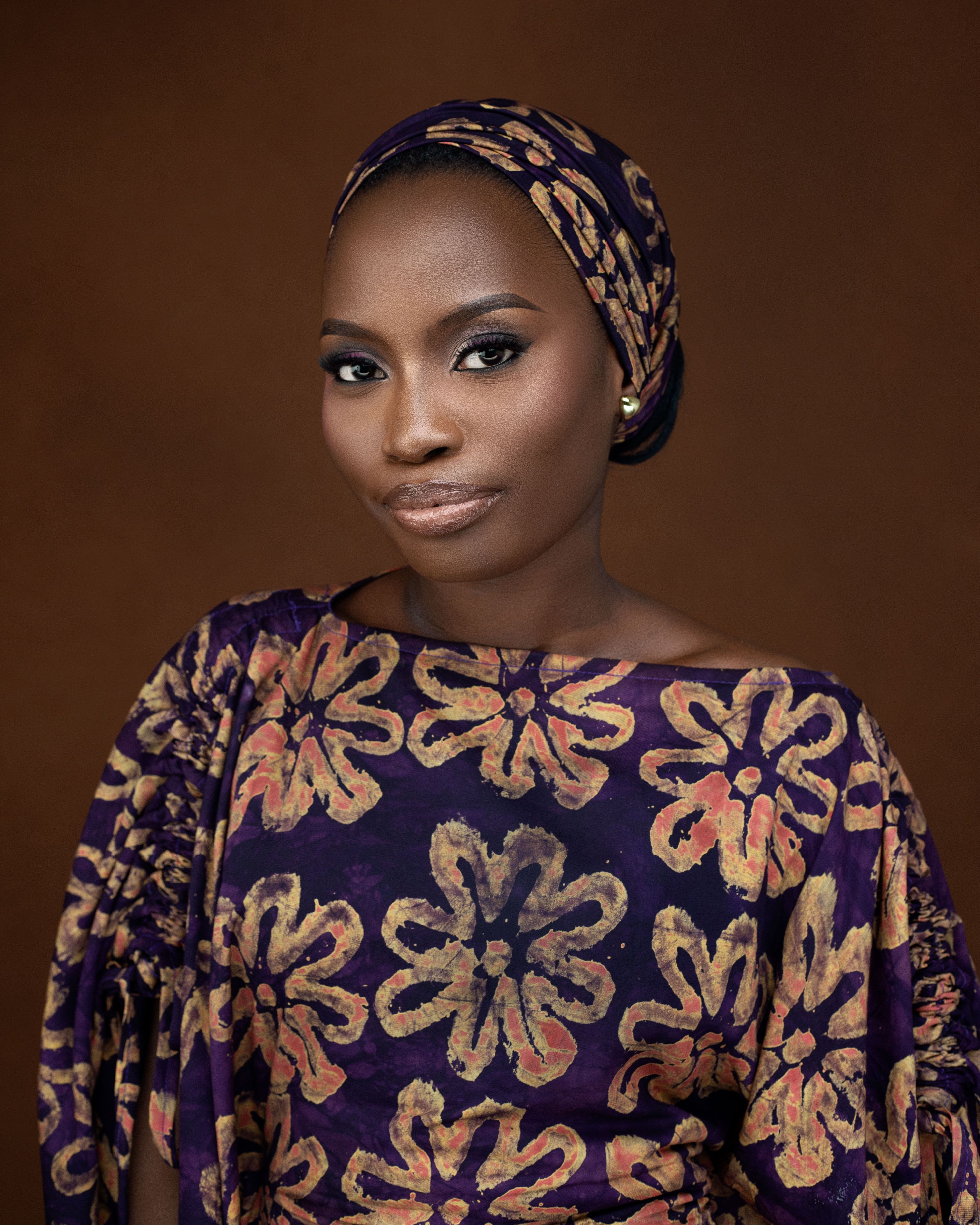 Stylish African Woman in Vibrant Traditional Attire · Free Stock Photo