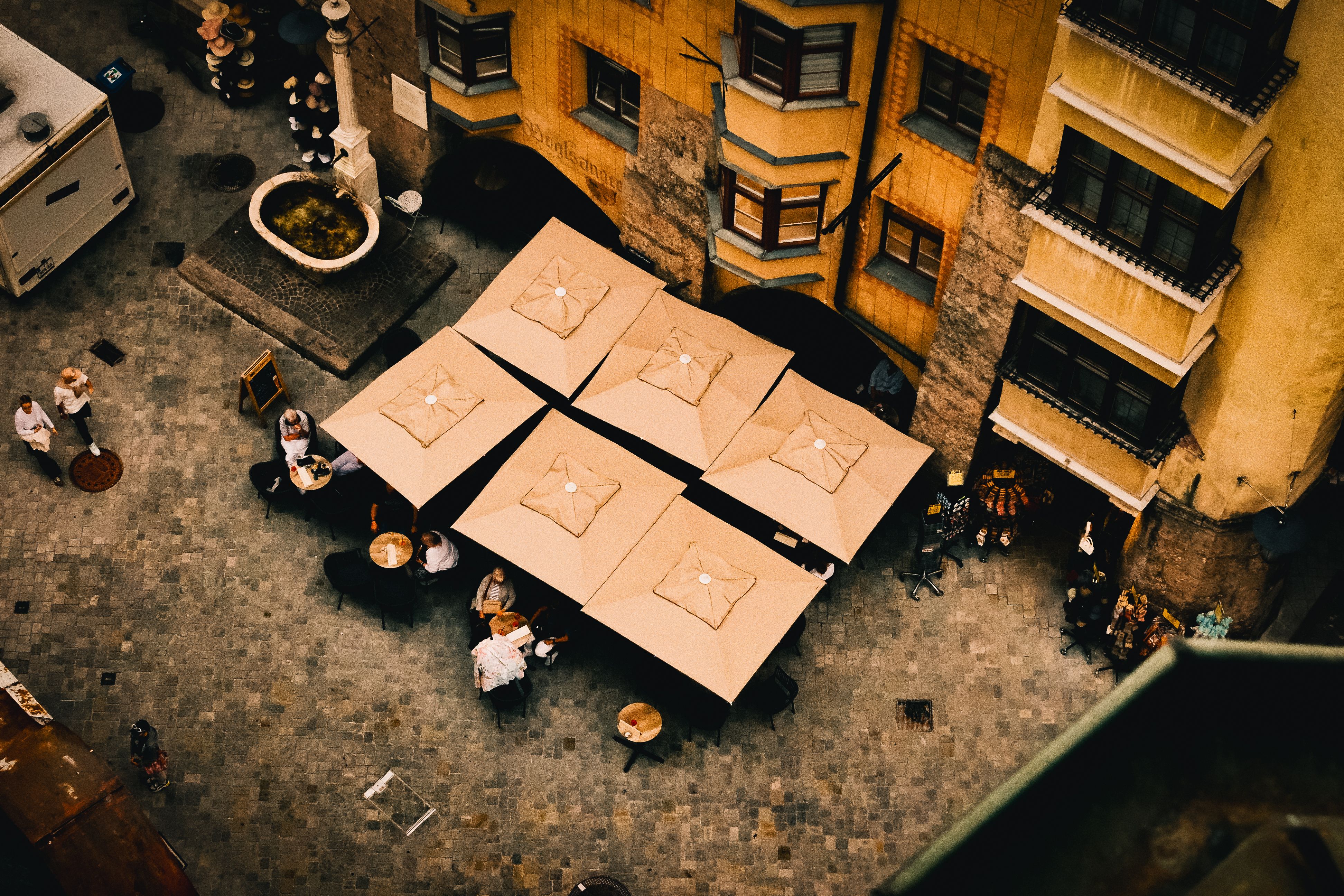 Aerial View of Outdoor Cafe in Innsbruck · Free Stock Photo
