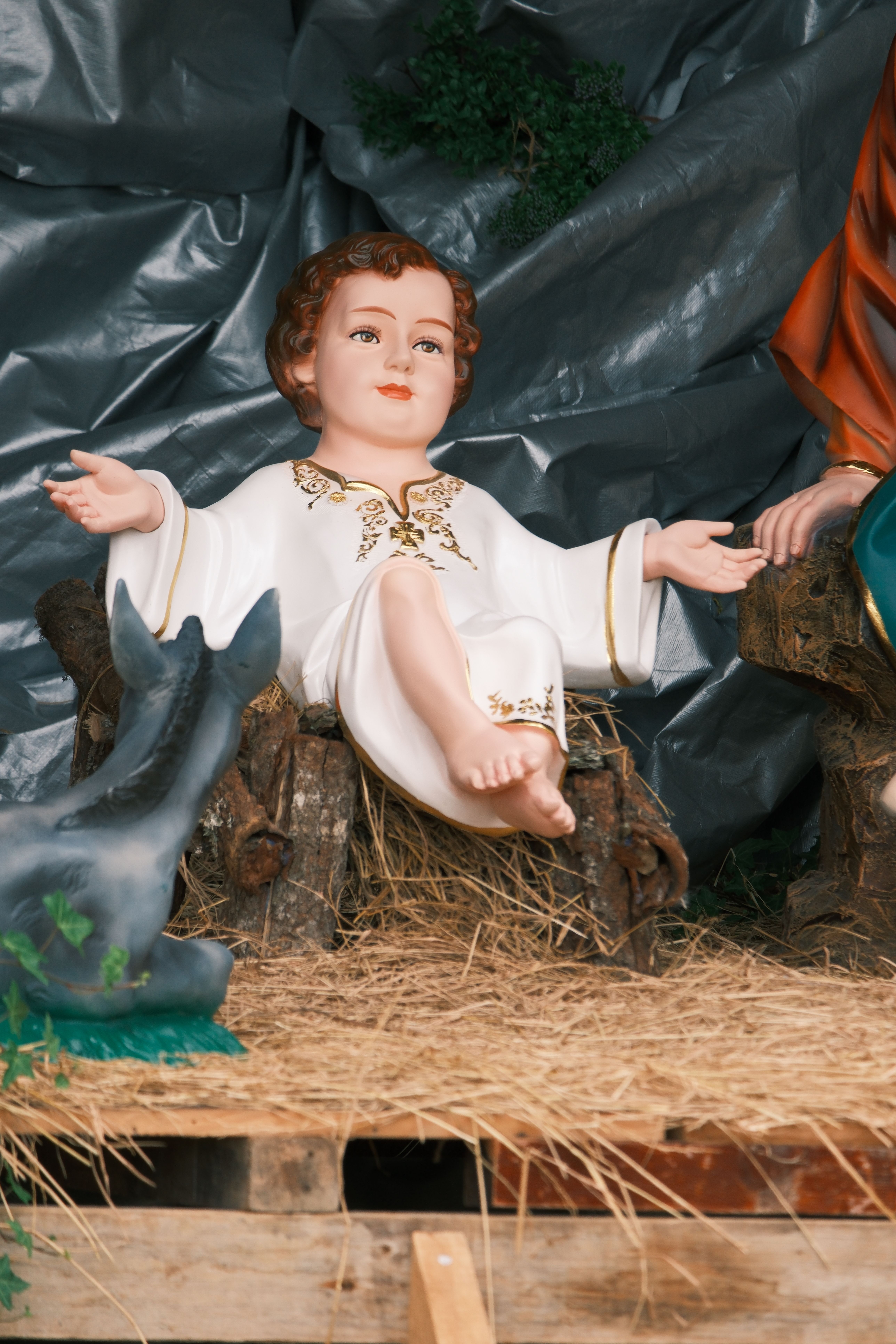 Nativity Scene Featuring Baby Jesus on Straw · Free Stock Photo