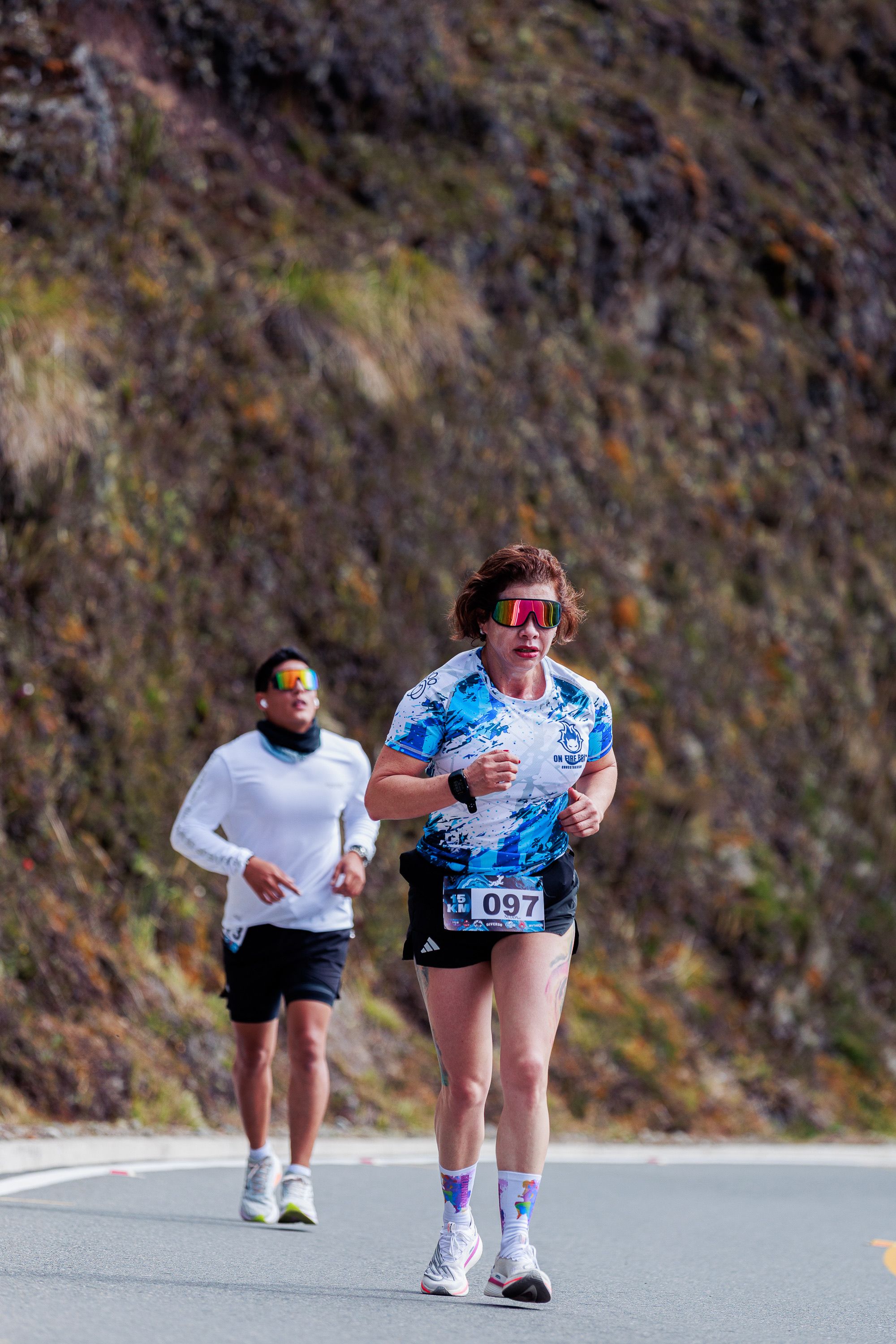 Runner Joyfully Competing in Outdoor Marathon · Free Stock Photo