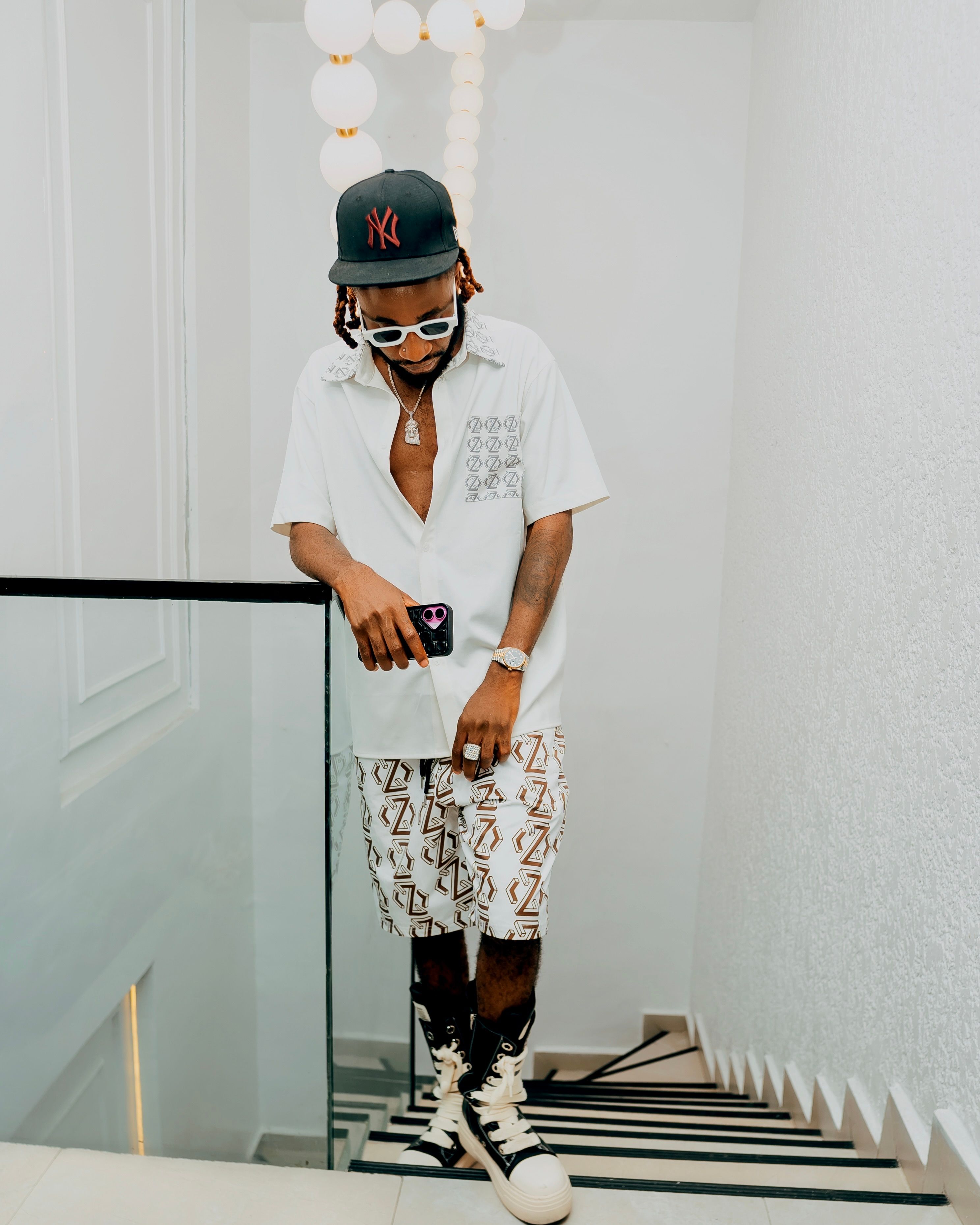 Stylish Streetwear Outfit with Bold Patterns · Free Stock Photo