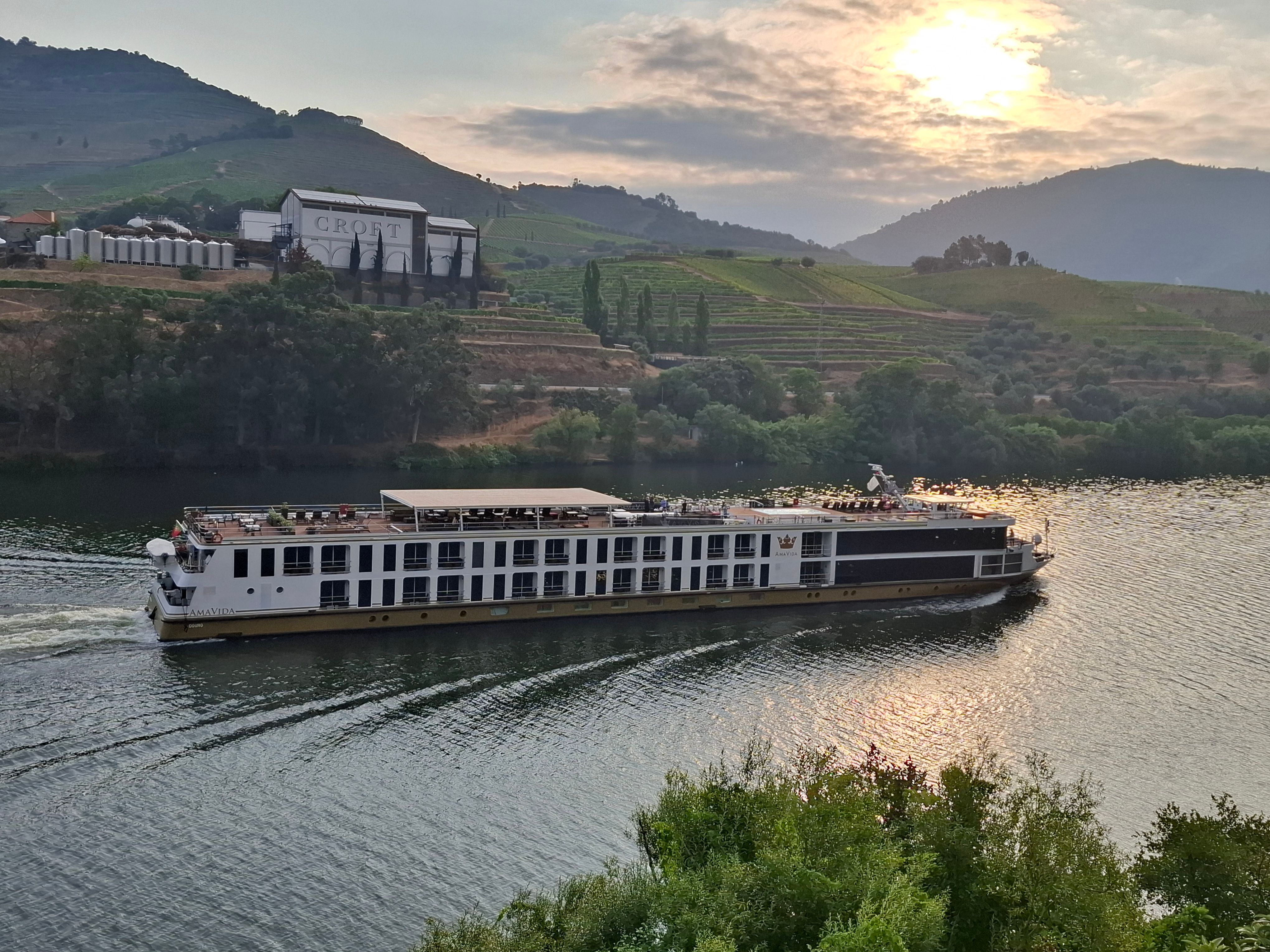 Scenic Douro River Cruise at Sunset · Free Stock Photo
