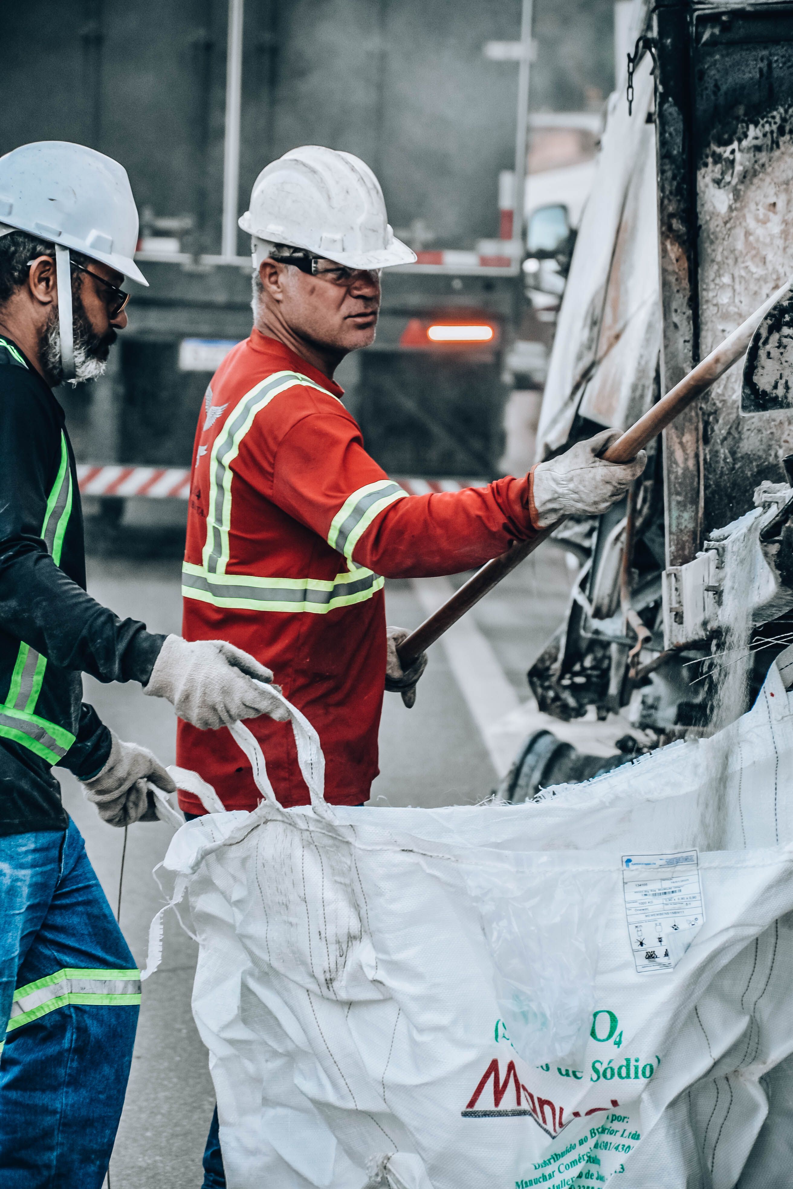 Construction Workers Handling Materials Safely · Free Stock Photo
