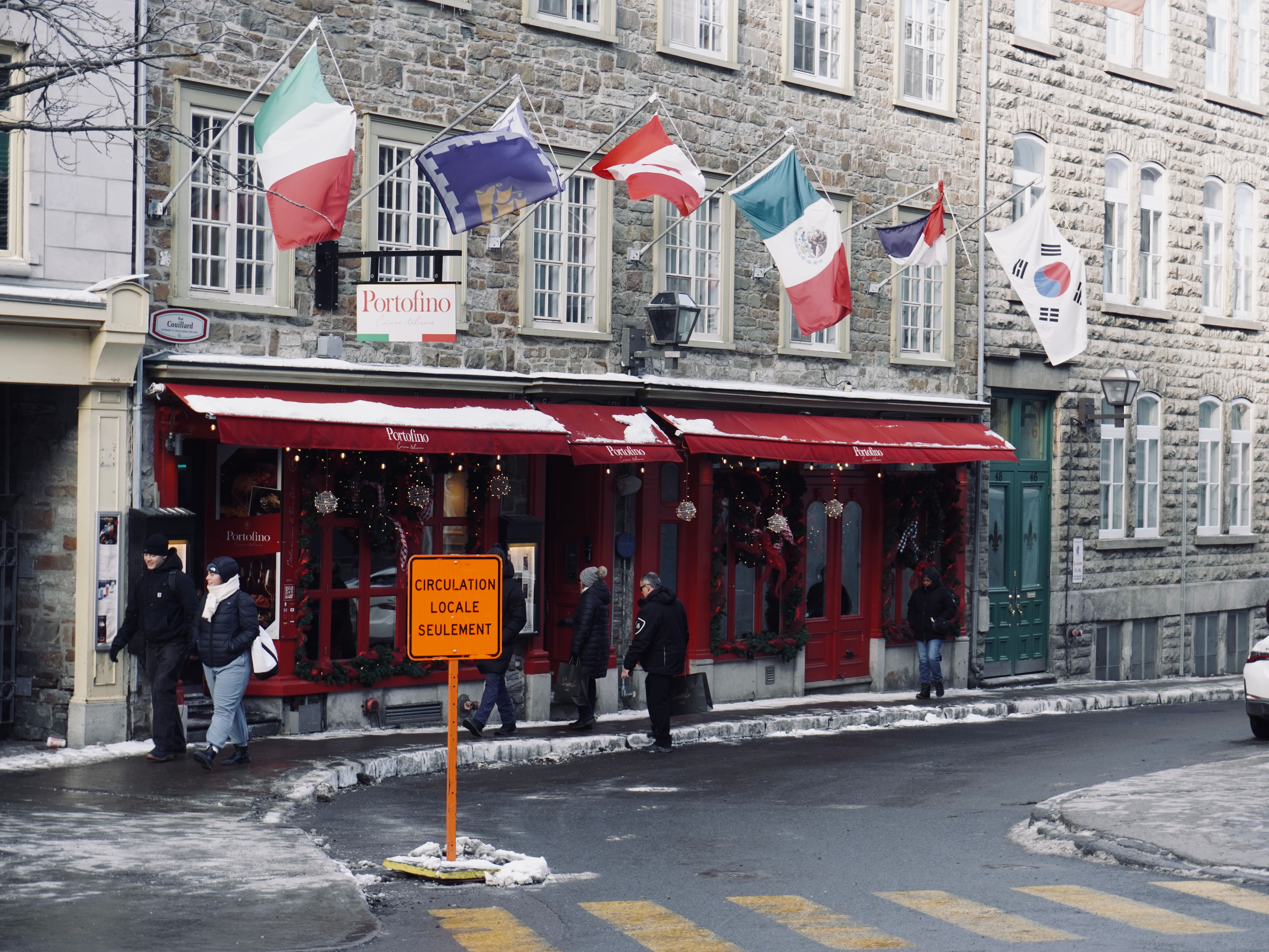 Charming Winter Scene at Portofino Cafe in Quebec · Free Stock Photo