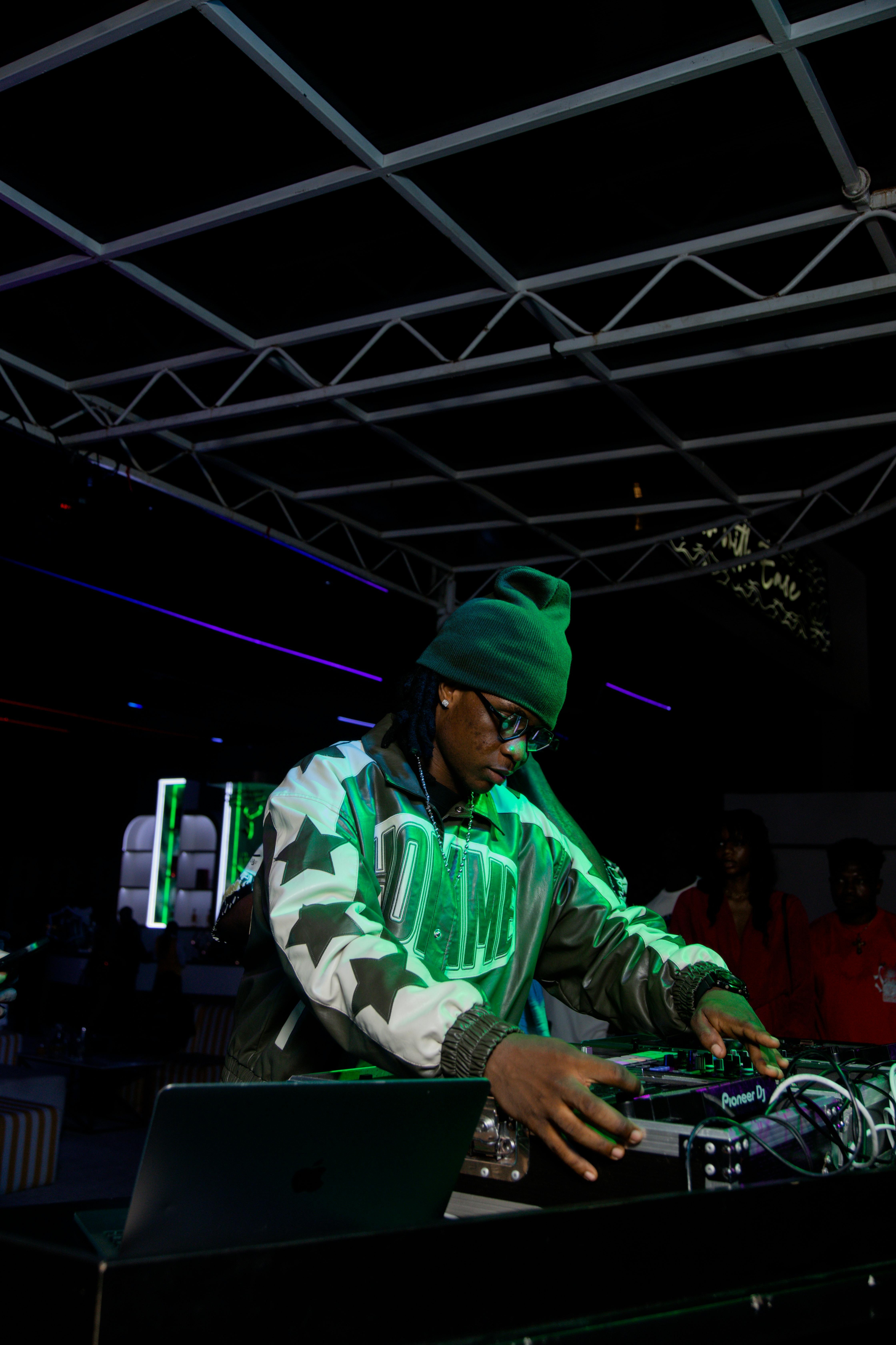 DJ Mixing Live at Nightclub Event · Free Stock Photo