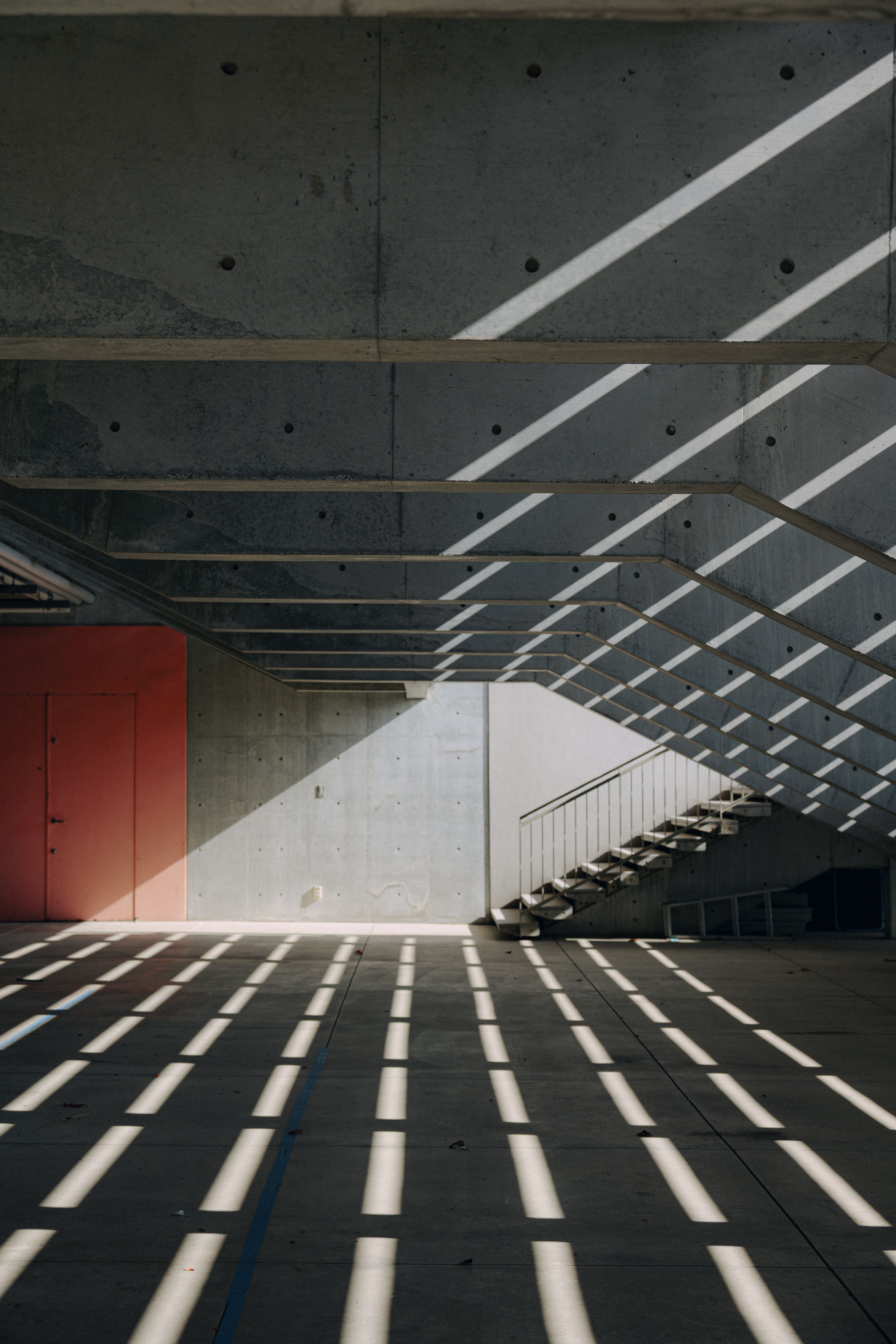 Modern Architectural Building with Dramatic Shadows · Free Stock Photo