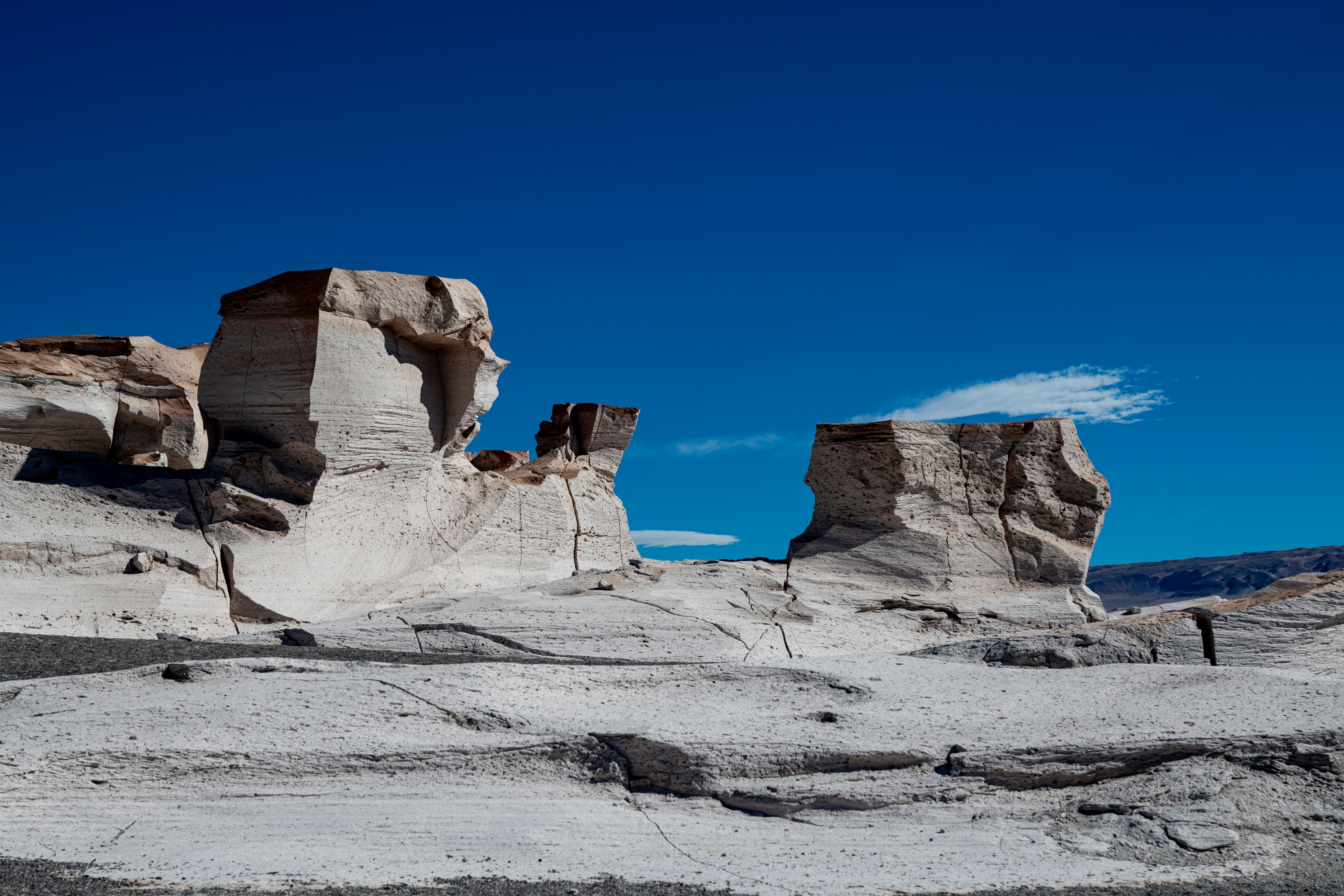 Stunning Rock Formations Under Clear Blue Sky · Free Stock Photo