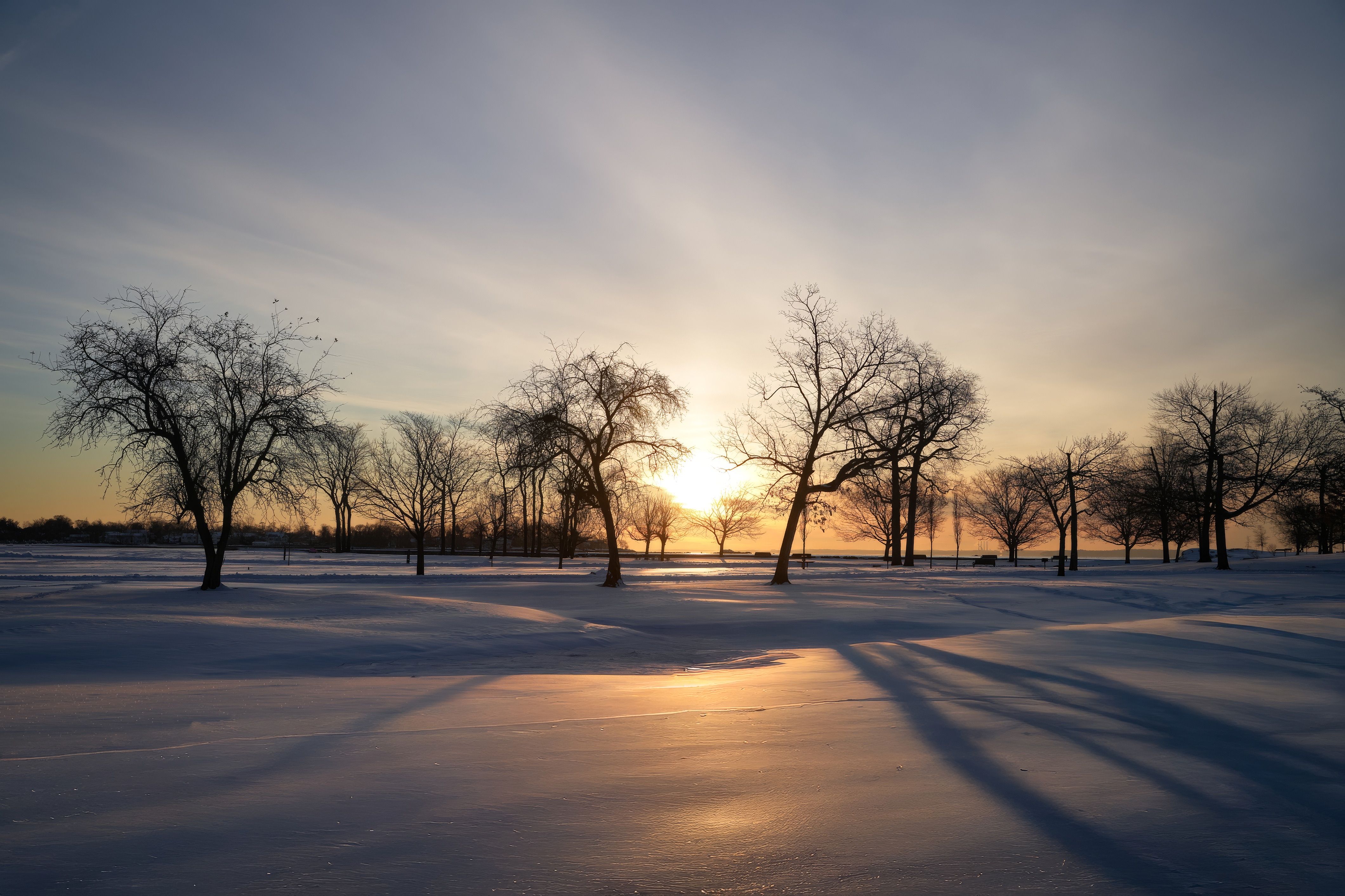 Tranquil Winter Sunset Over Snowy Landscape · Free Stock Photo