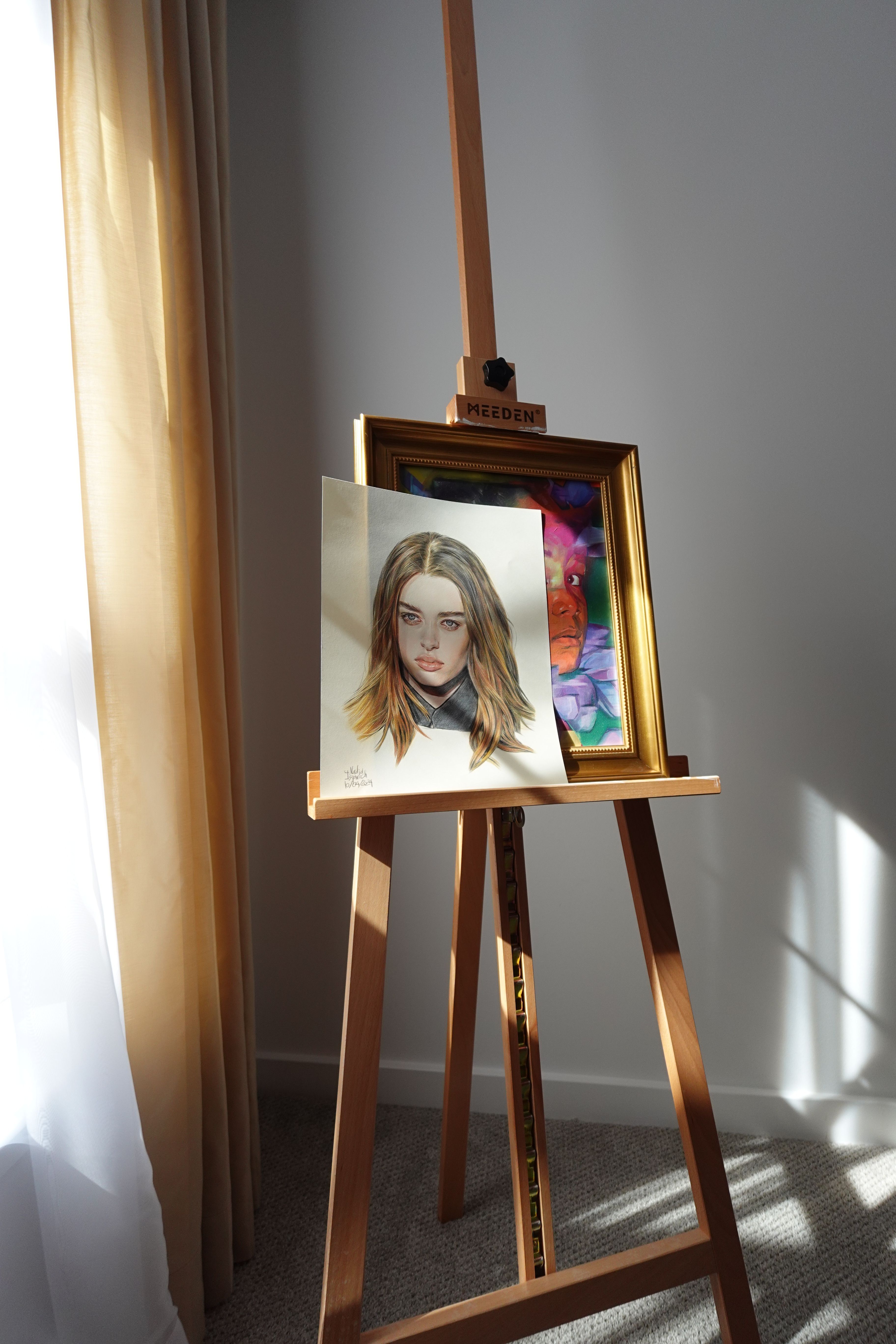 Portrait Artwork on Easel in Sunlit Room · Free Stock Photo