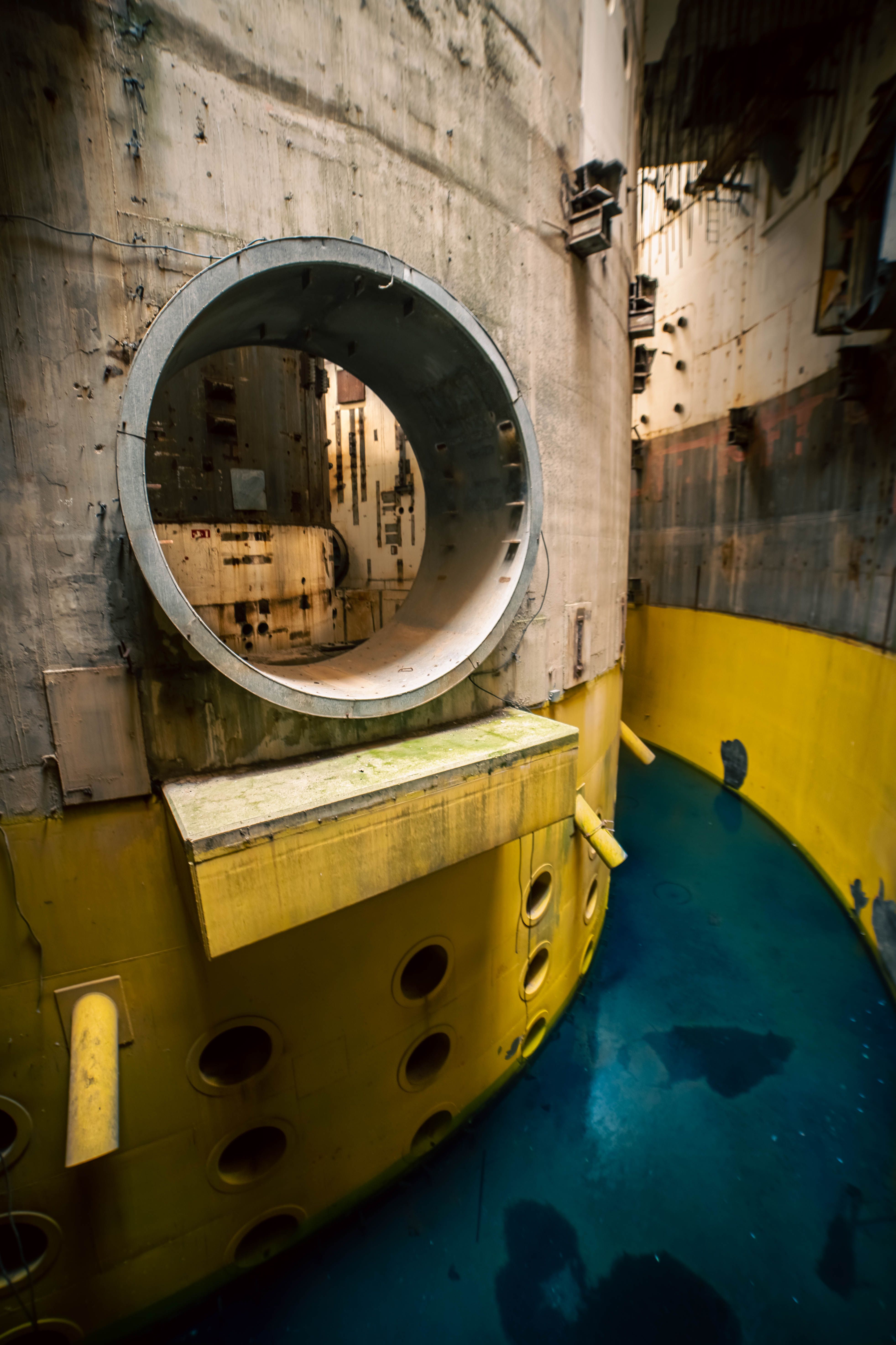 Industrial Facility Interior with Circular Cutout · Free Stock Photo