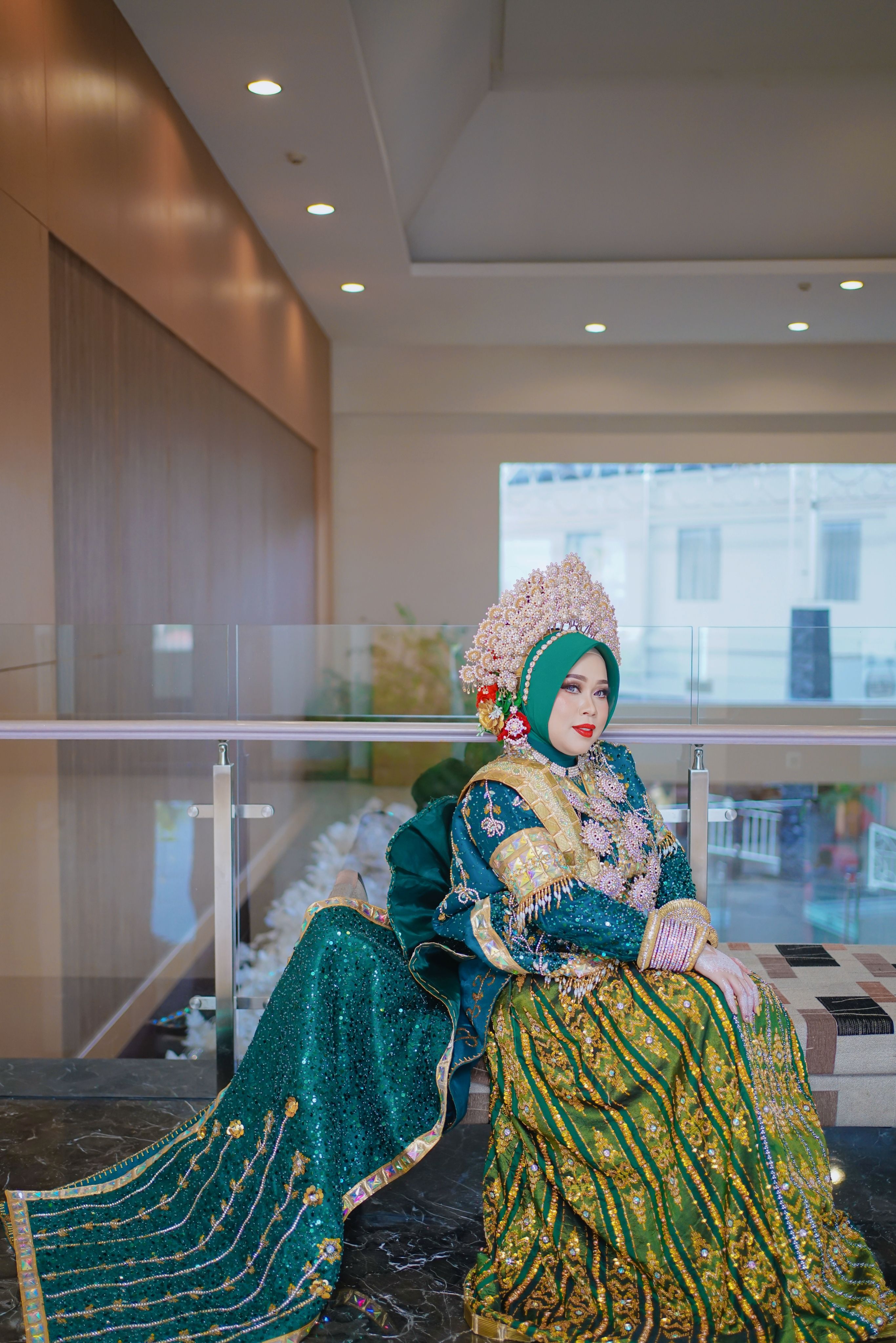 Indonesian Bride in Traditional Green Attire · Free Stock Photo