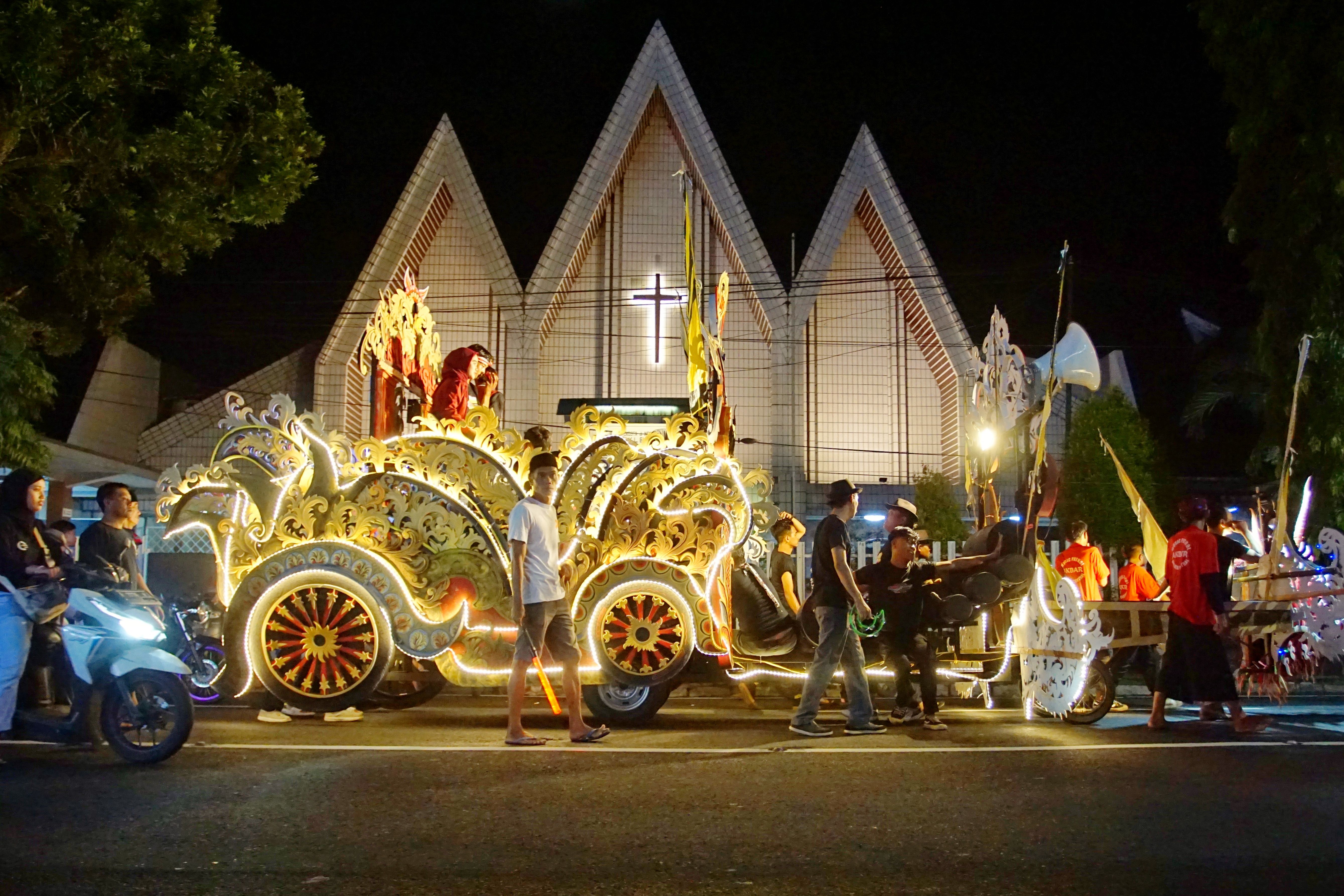 Colorful Night Parade with Illuminated Float · Free Stock Photo
