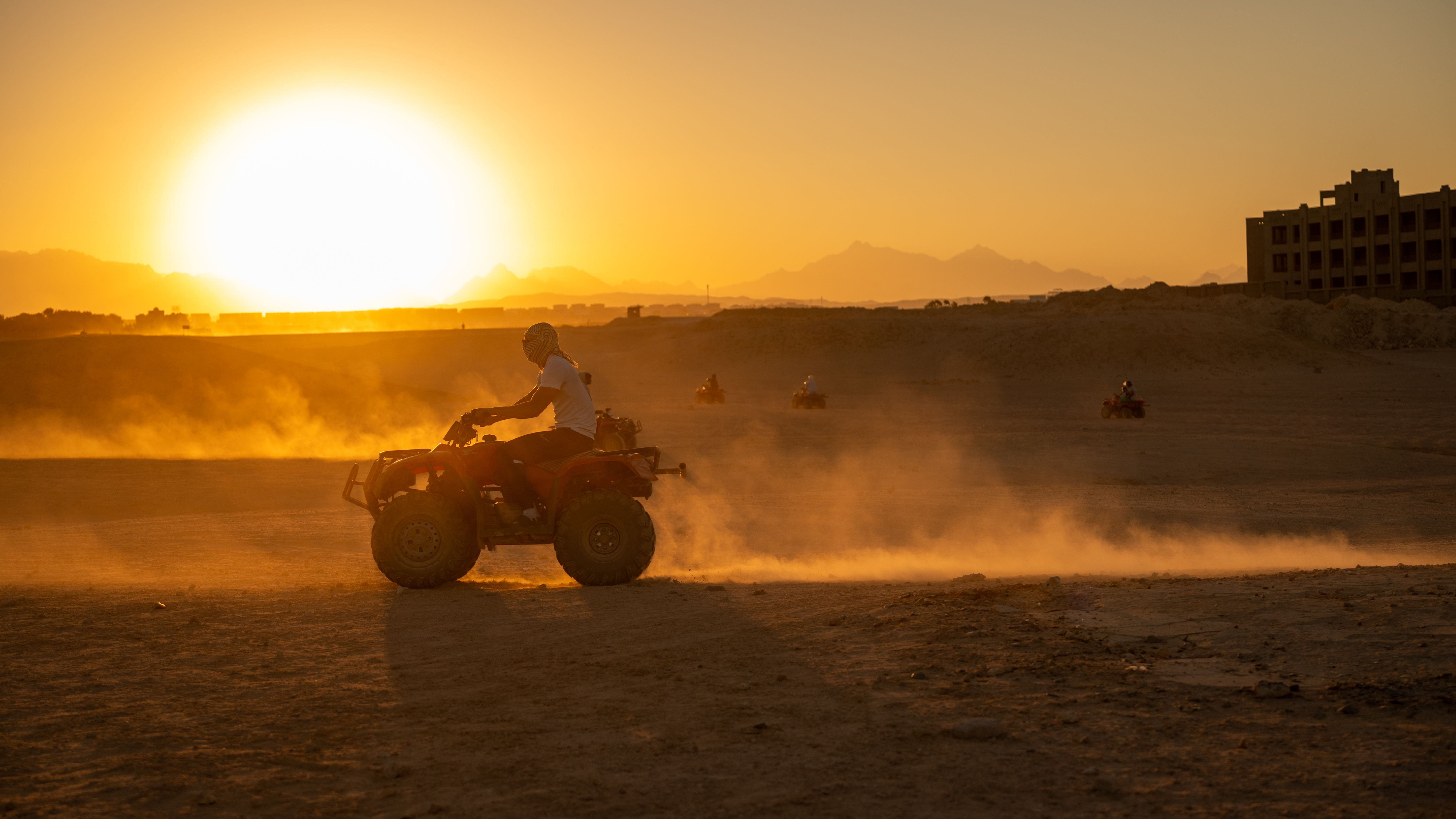 Desert Adventure with ATVs at Sunset · Free Stock Photo