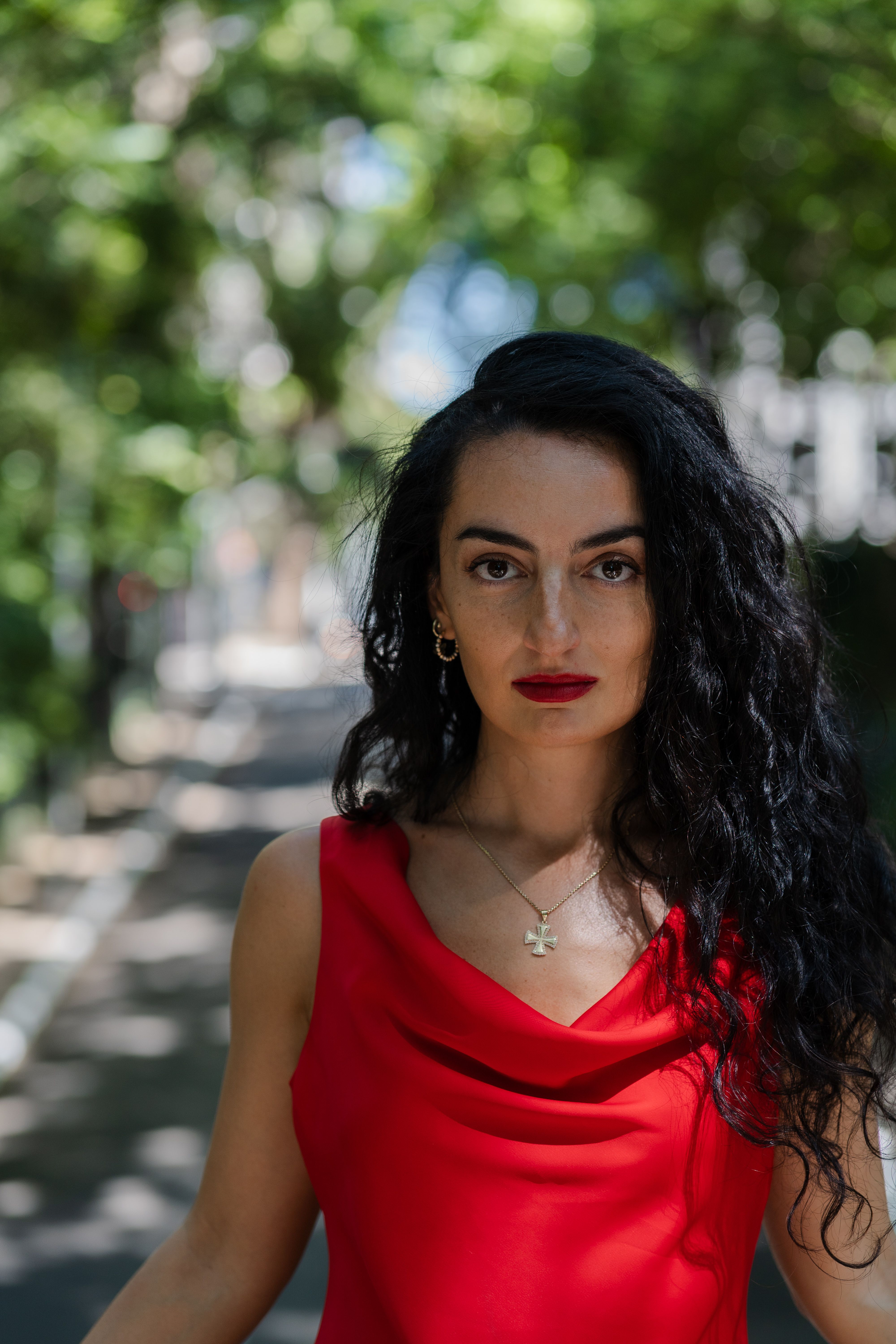 Portrait of Woman in Red Dress Outdoors · Free Stock Photo