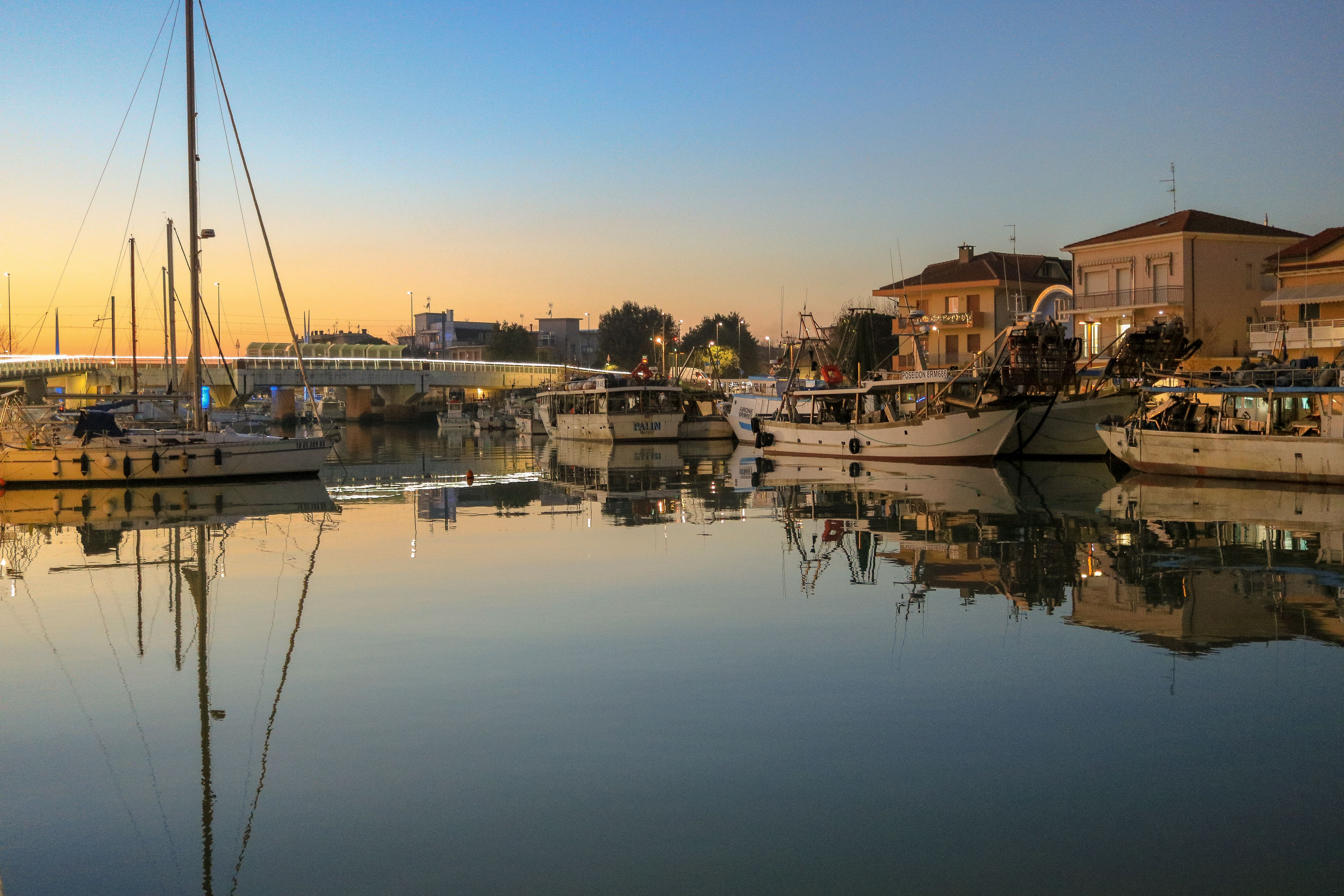 Serene Harbor Scene at Sunset · Free Stock Photo