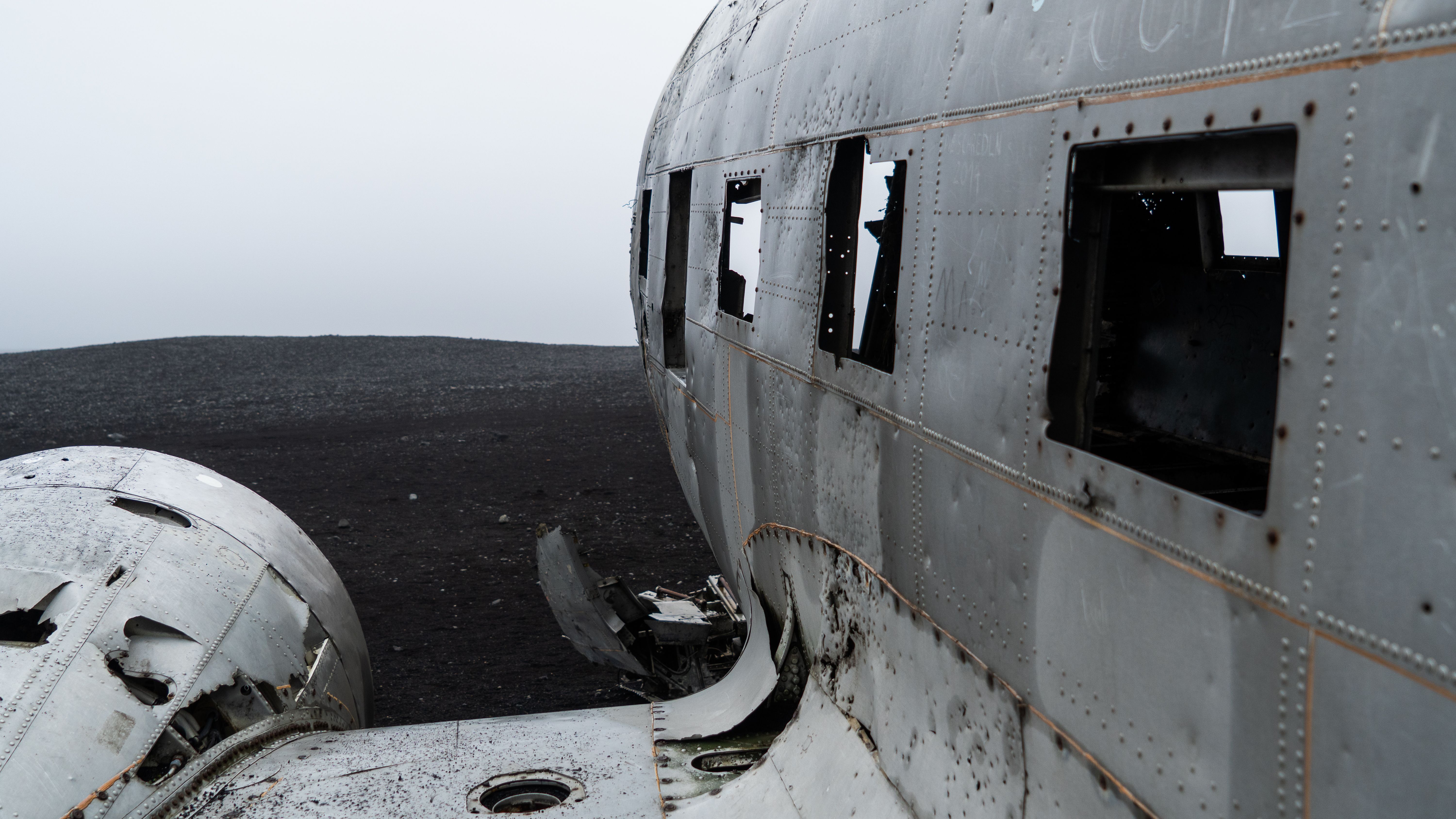 Abandoned Airplane Wreck on Black Sand Beach · Free Stock Photo