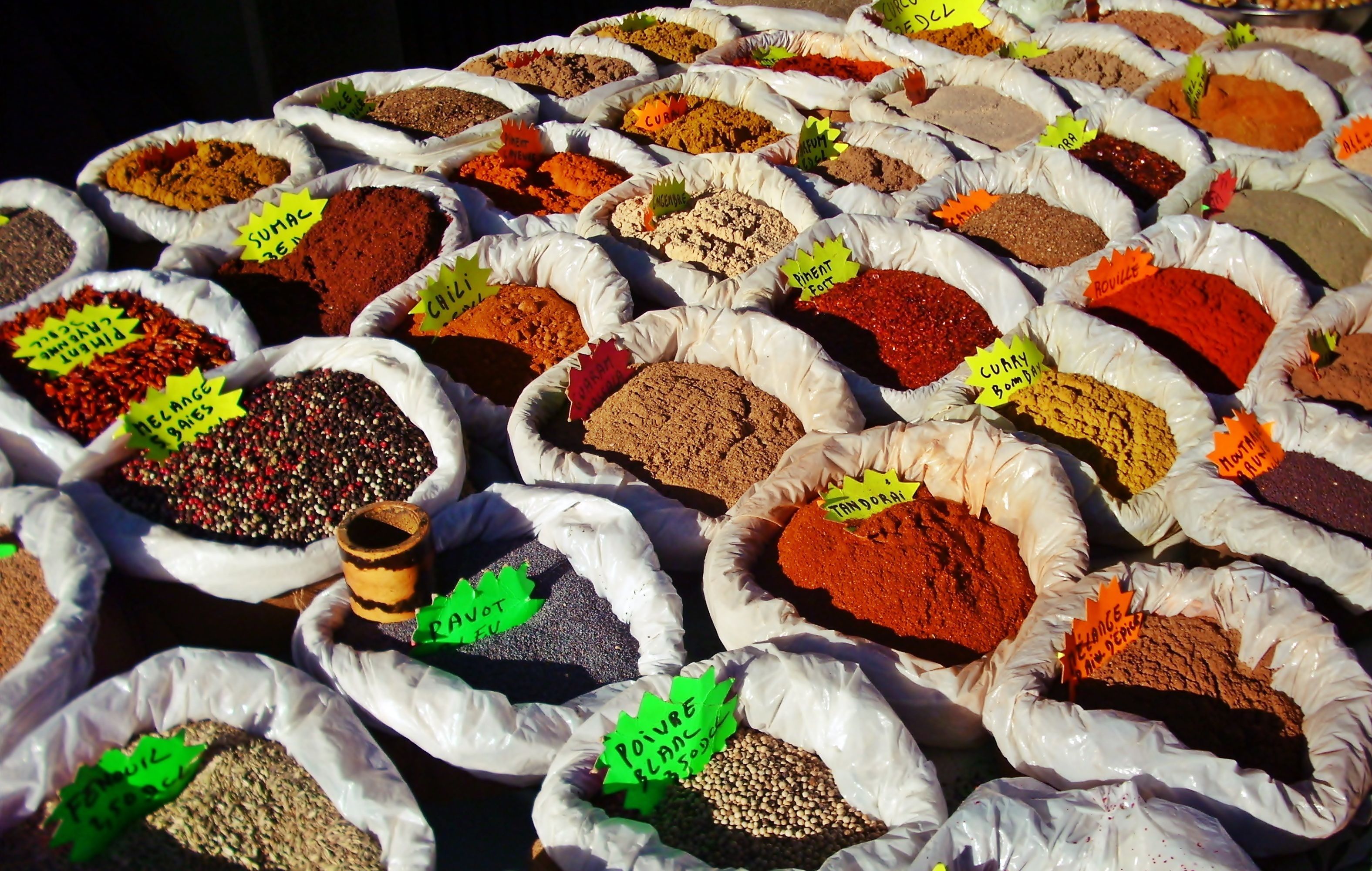 Vibrant Assortment of Market Spices on Display · Free Stock Photo