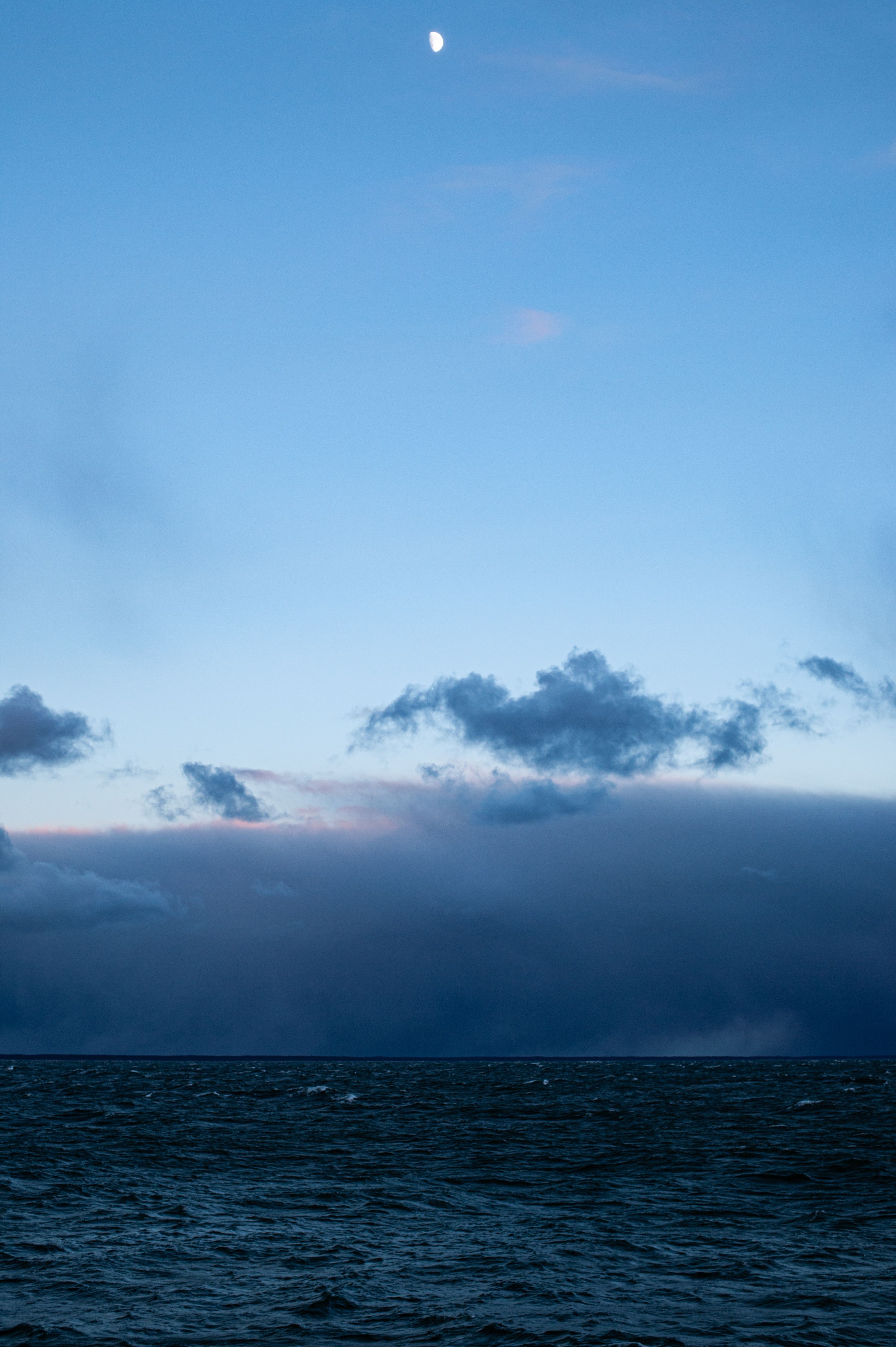 Serene Twilight Ocean Scene with Moon · Free Stock Photo