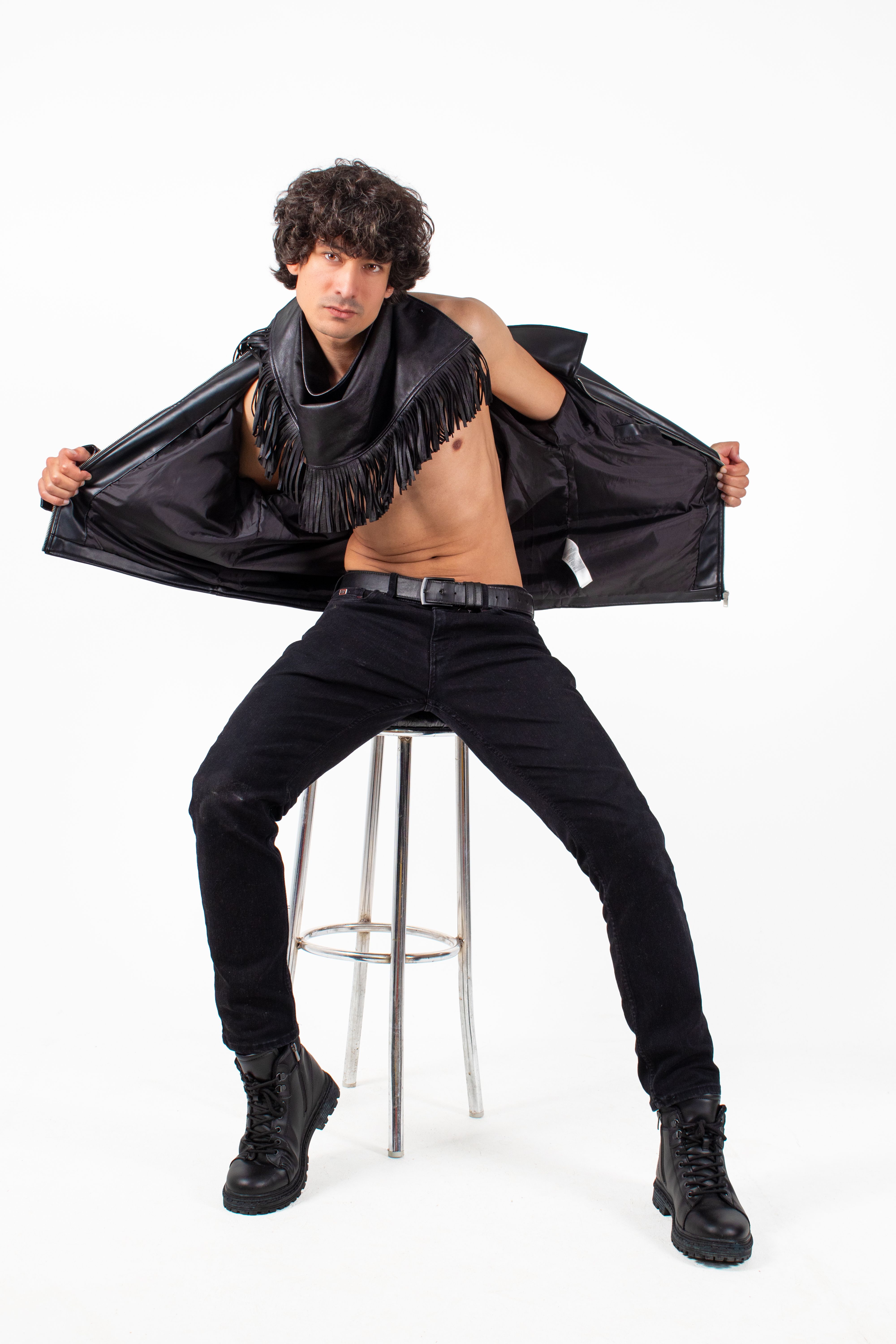 Stylish Male Model Posing in Photo Studio · Free Stock Photo