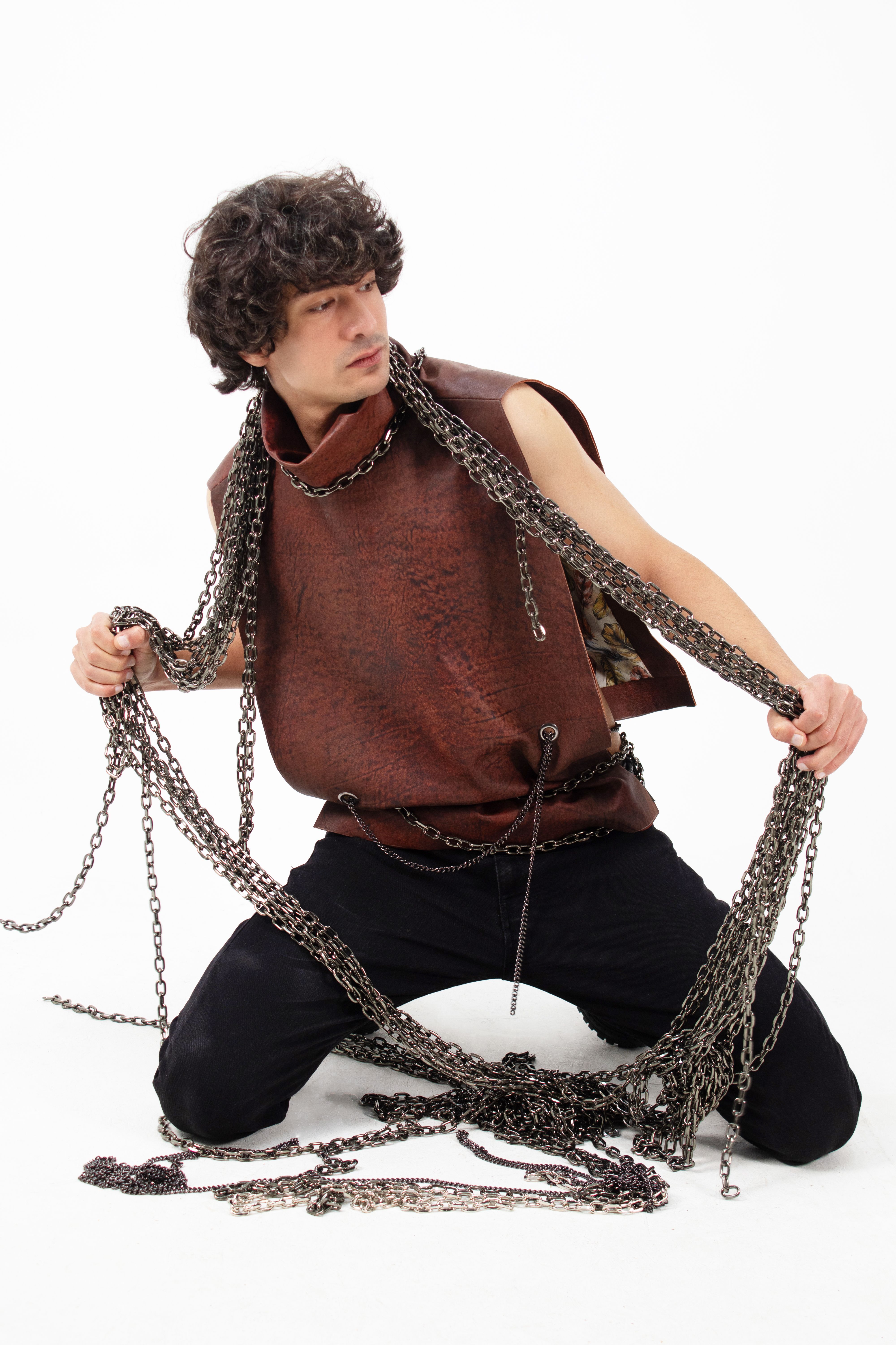Edgy Fashion Shoot with Chains on White Background · Free Stock Photo