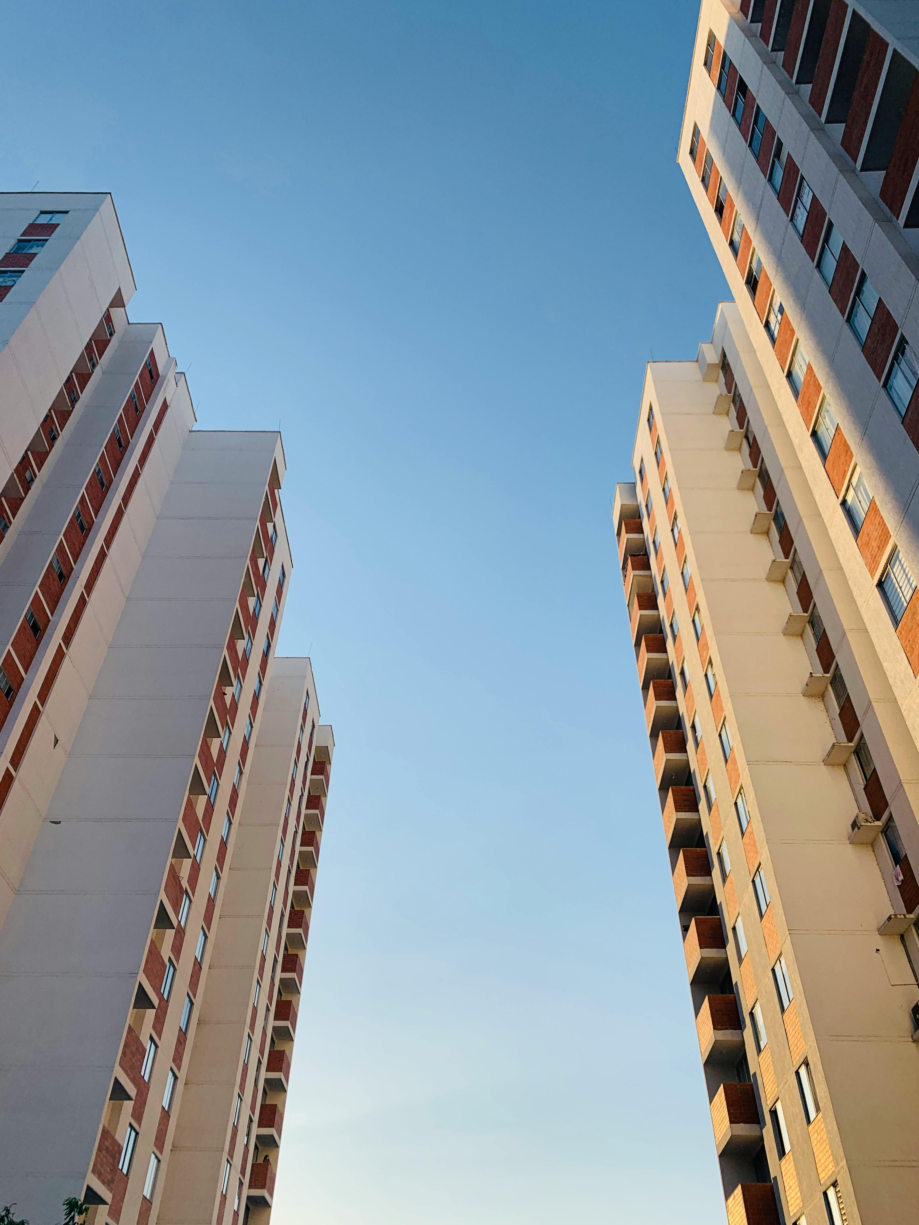 White Concrete High Rise Buildings · Free Stock Photo