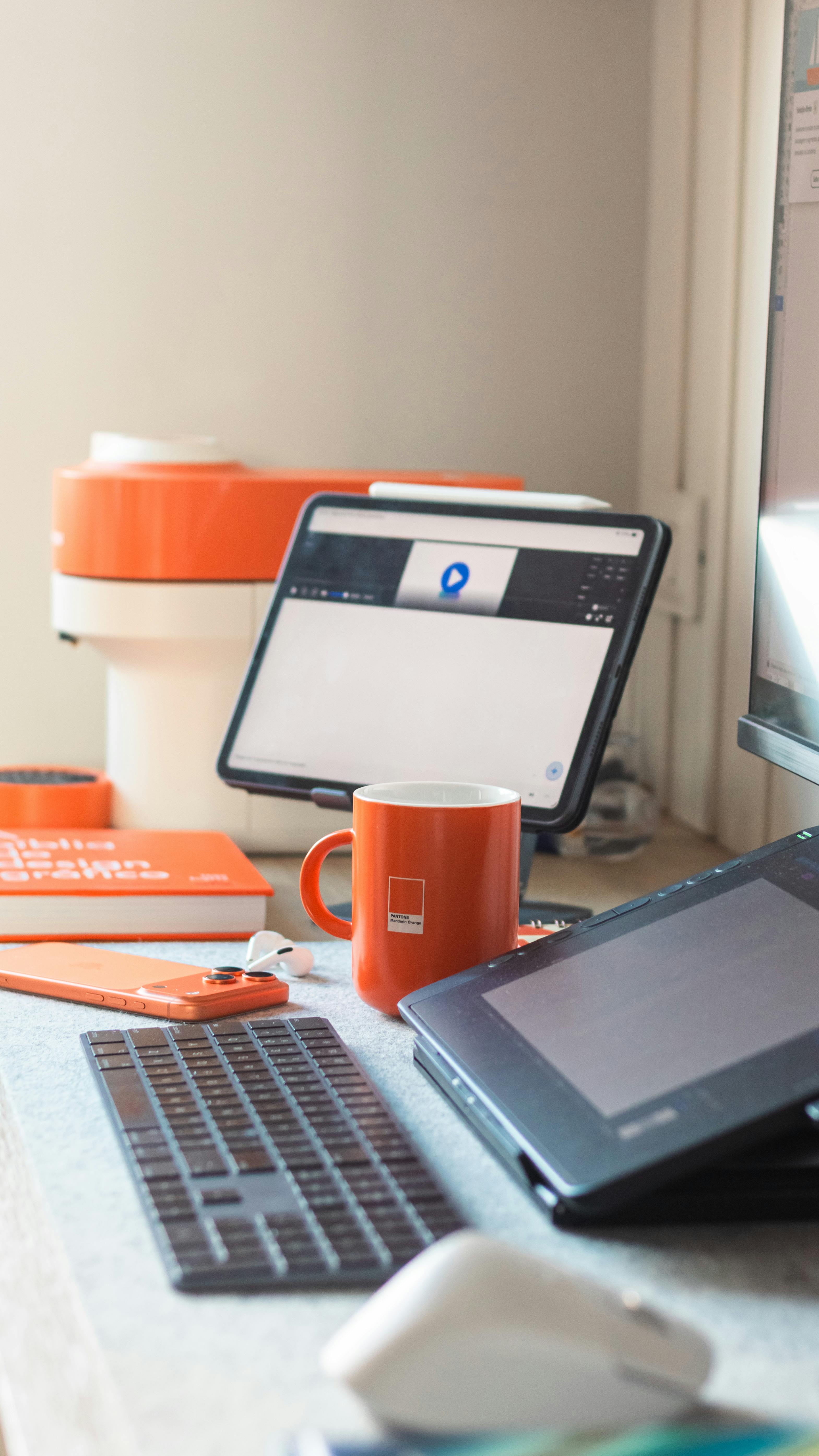 Modern Workspace with Orange Accents · Free Stock Photo