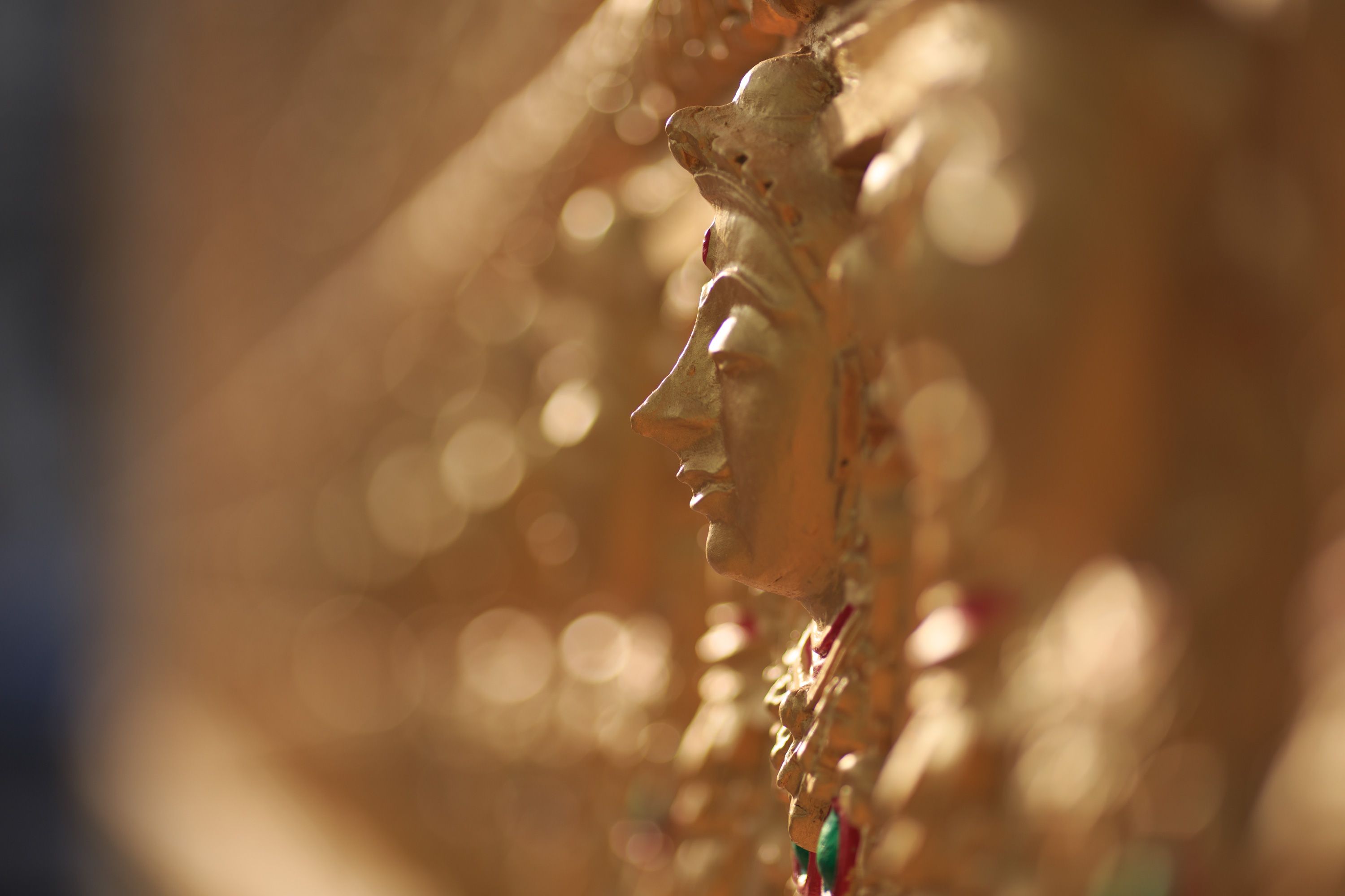 Golden Sculpture with Intricate Details in Focus · Free Stock Photo
