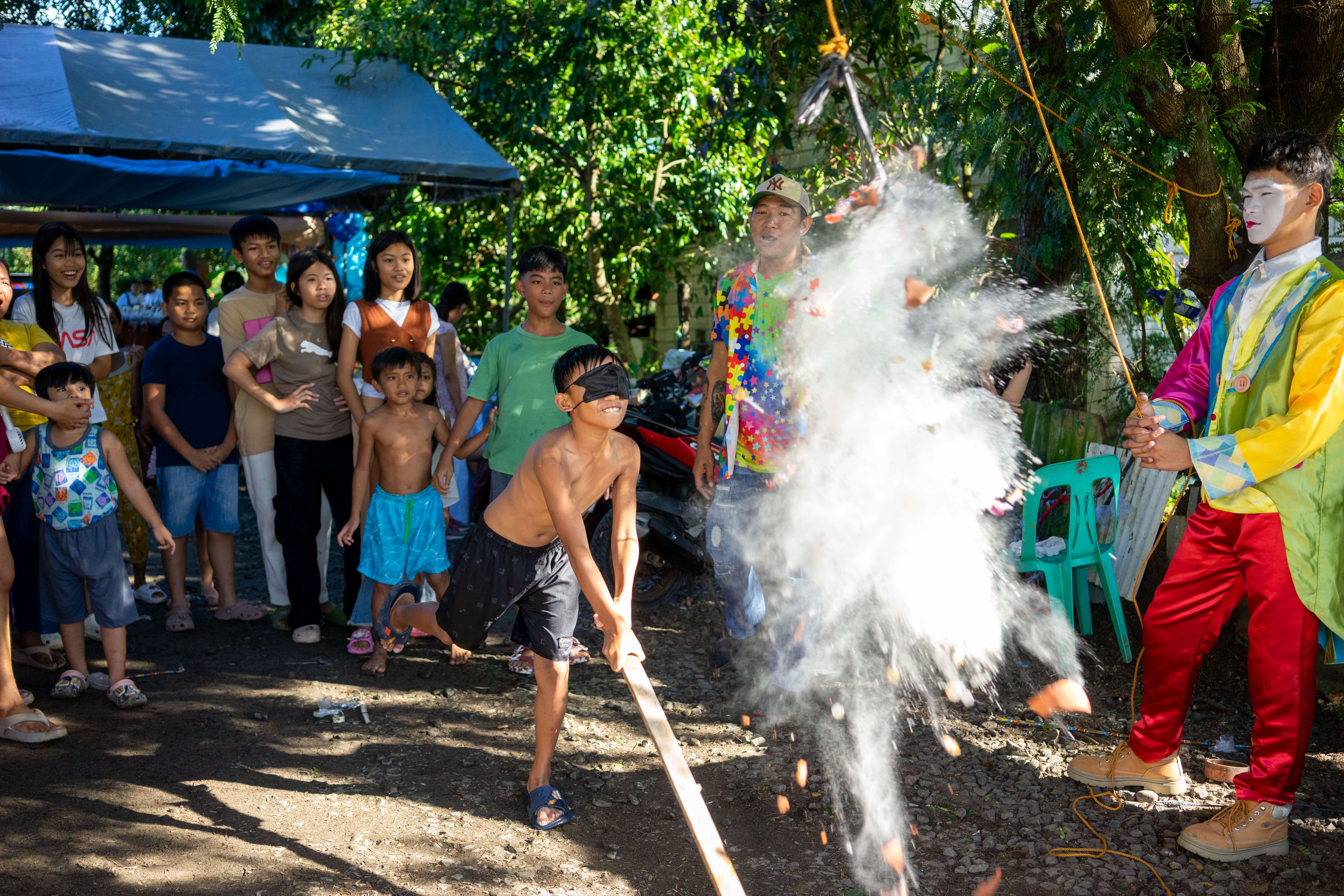 Outdoor Children's Party with Piñata Game and Laughter · Free Stock Photo