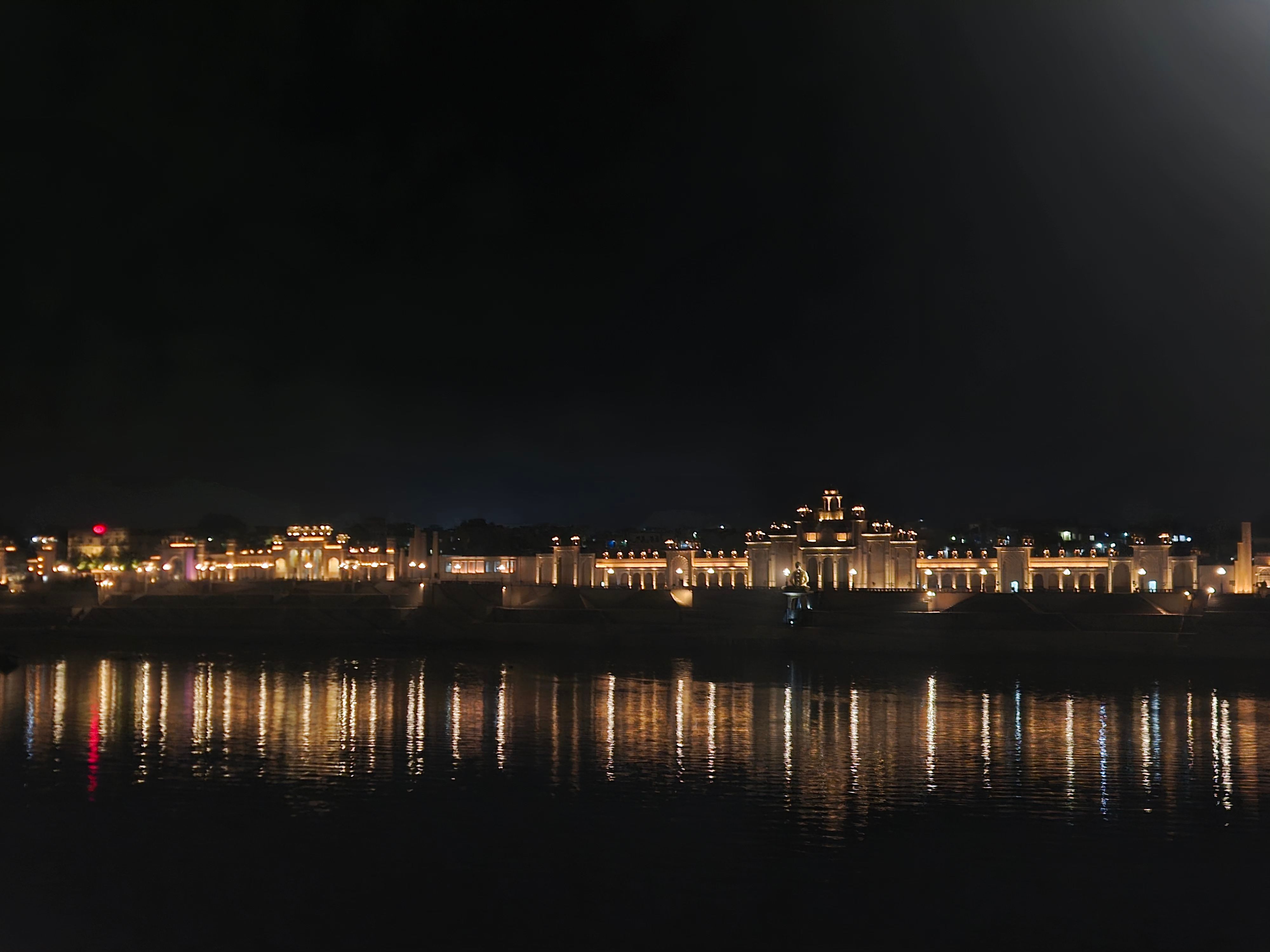 Illuminated Landmark at Night with Water Reflection · Free Stock Photo