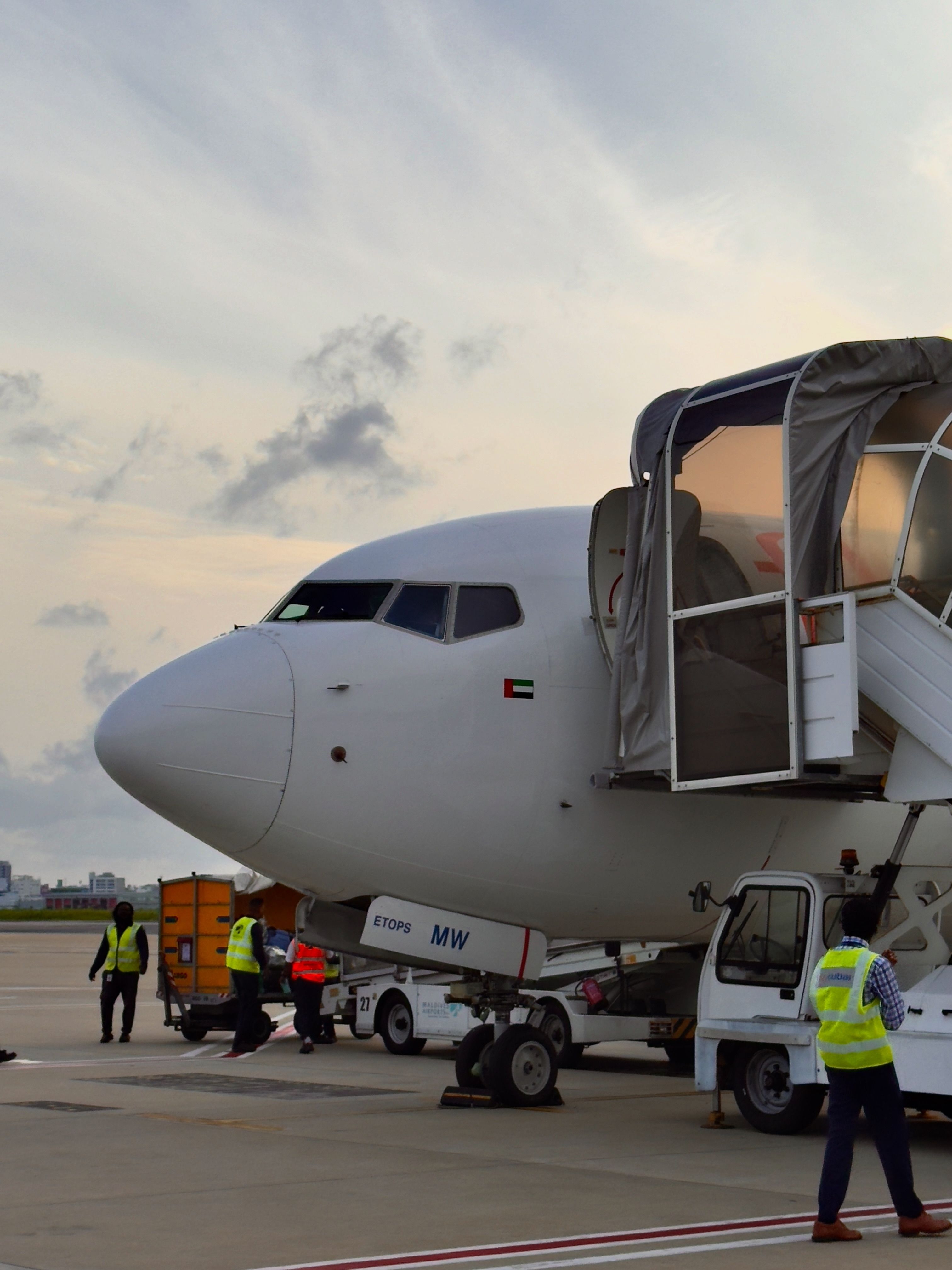 Passenger Jet Preparing for Boarding at Airport · Free Stock Photo