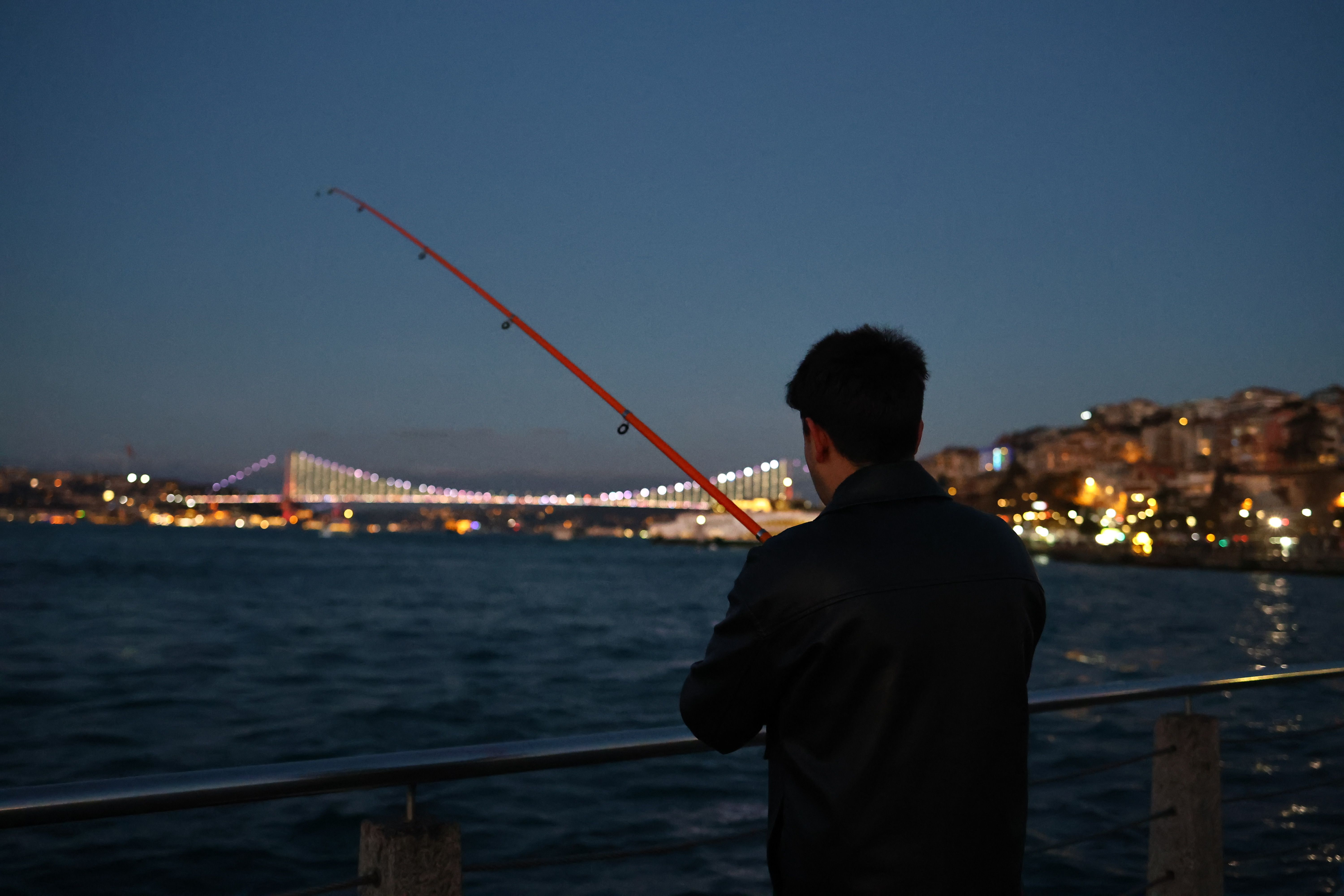 Evening Fishing at Bosphorus with Bridge View · Free Stock Photo