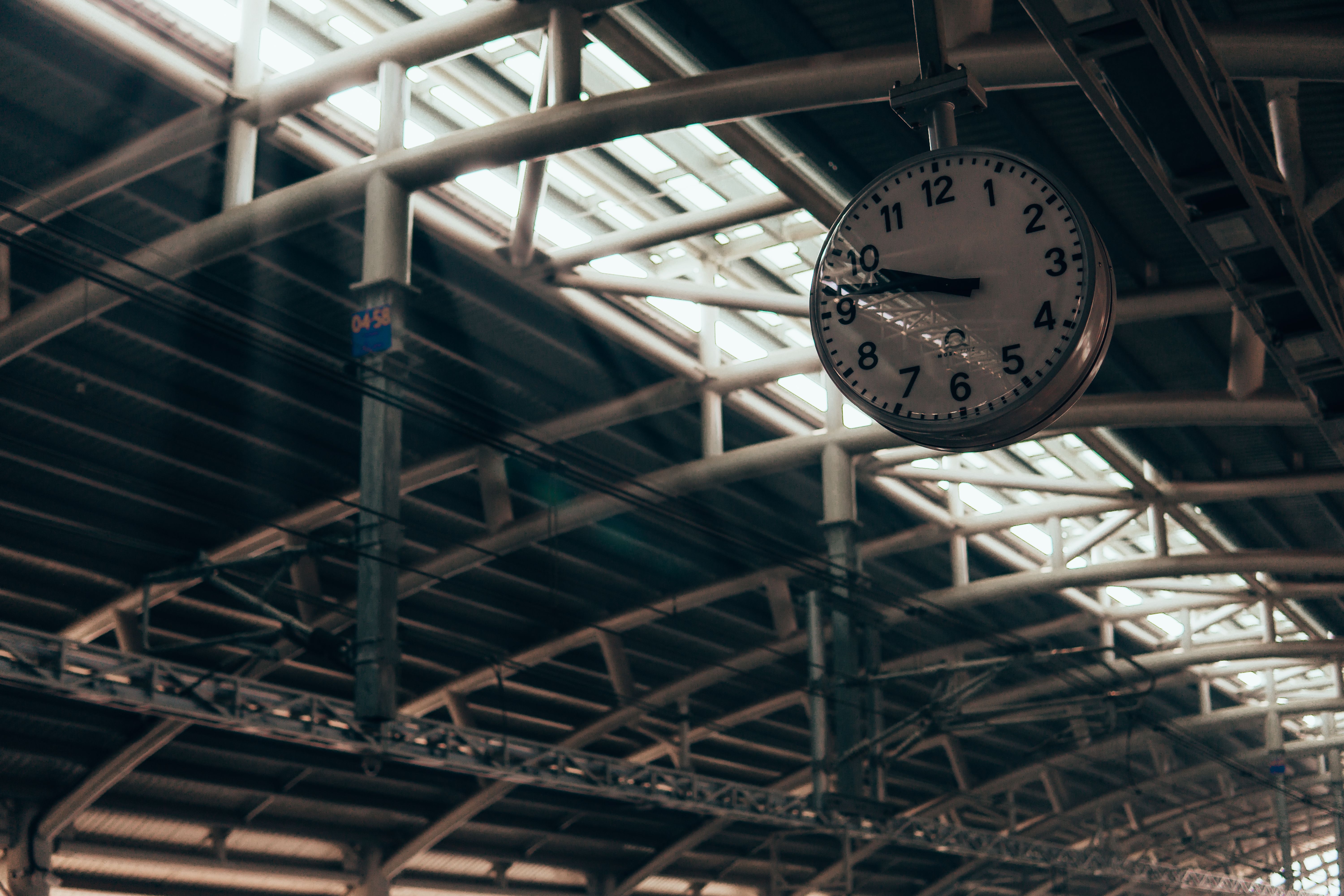 Clock in Industrial Metro Station Interior · Free Stock Photo