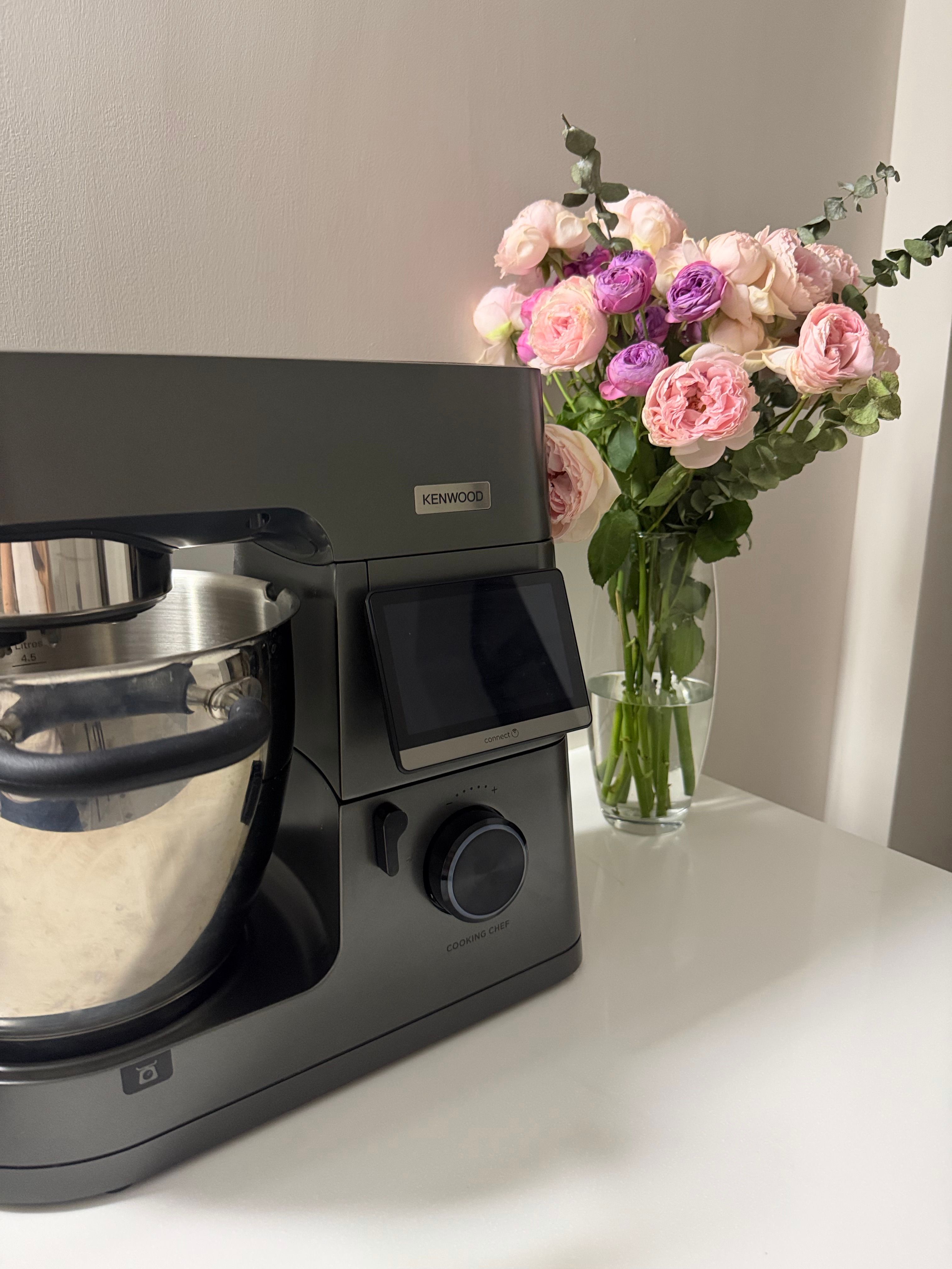 Elegant Kitchen Mixer with Vibrant Floral Arrangement · Free Stock Photo