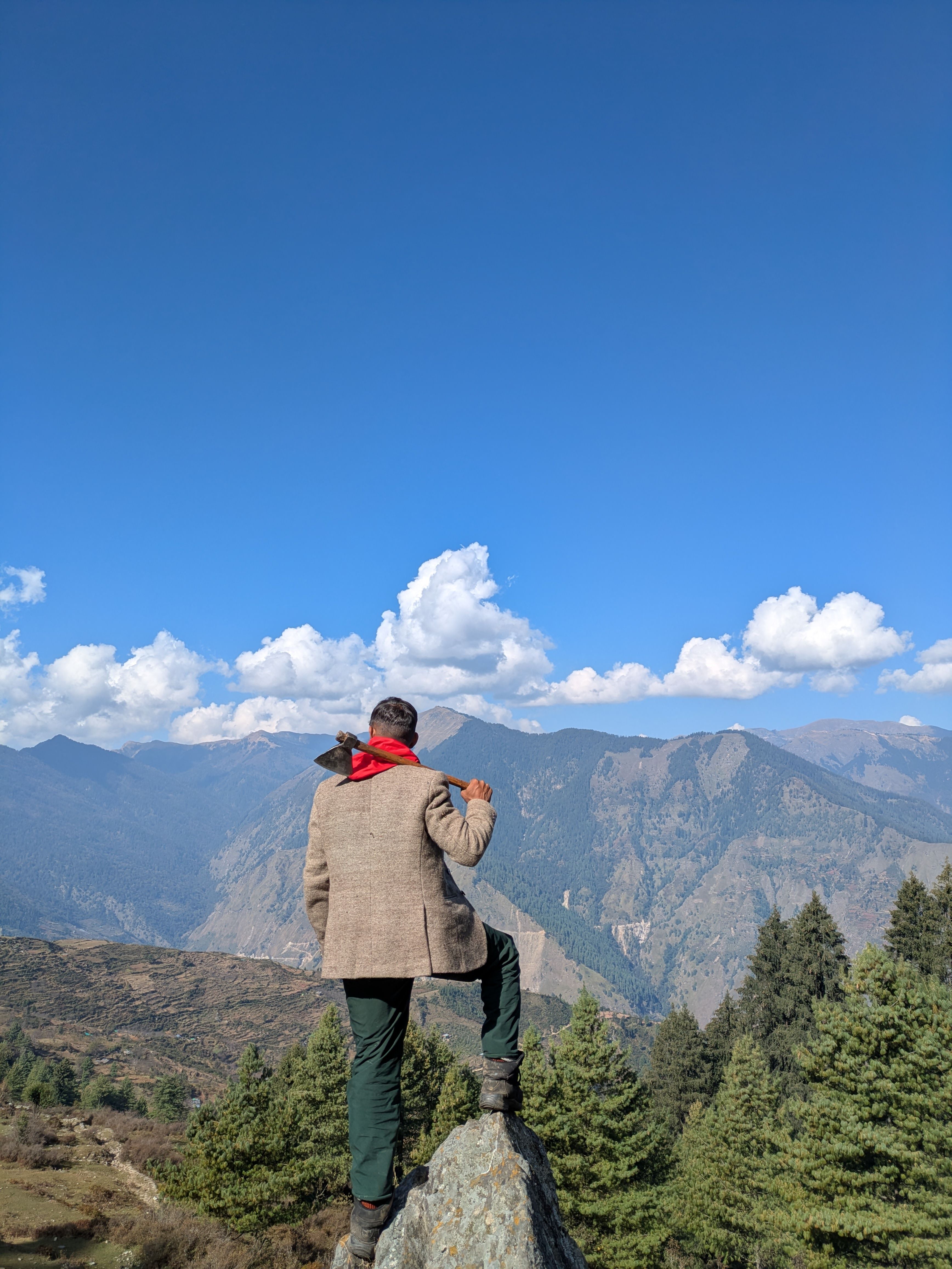 Man Standing on Rock Overlooking Mountain Range · Free Stock Photo