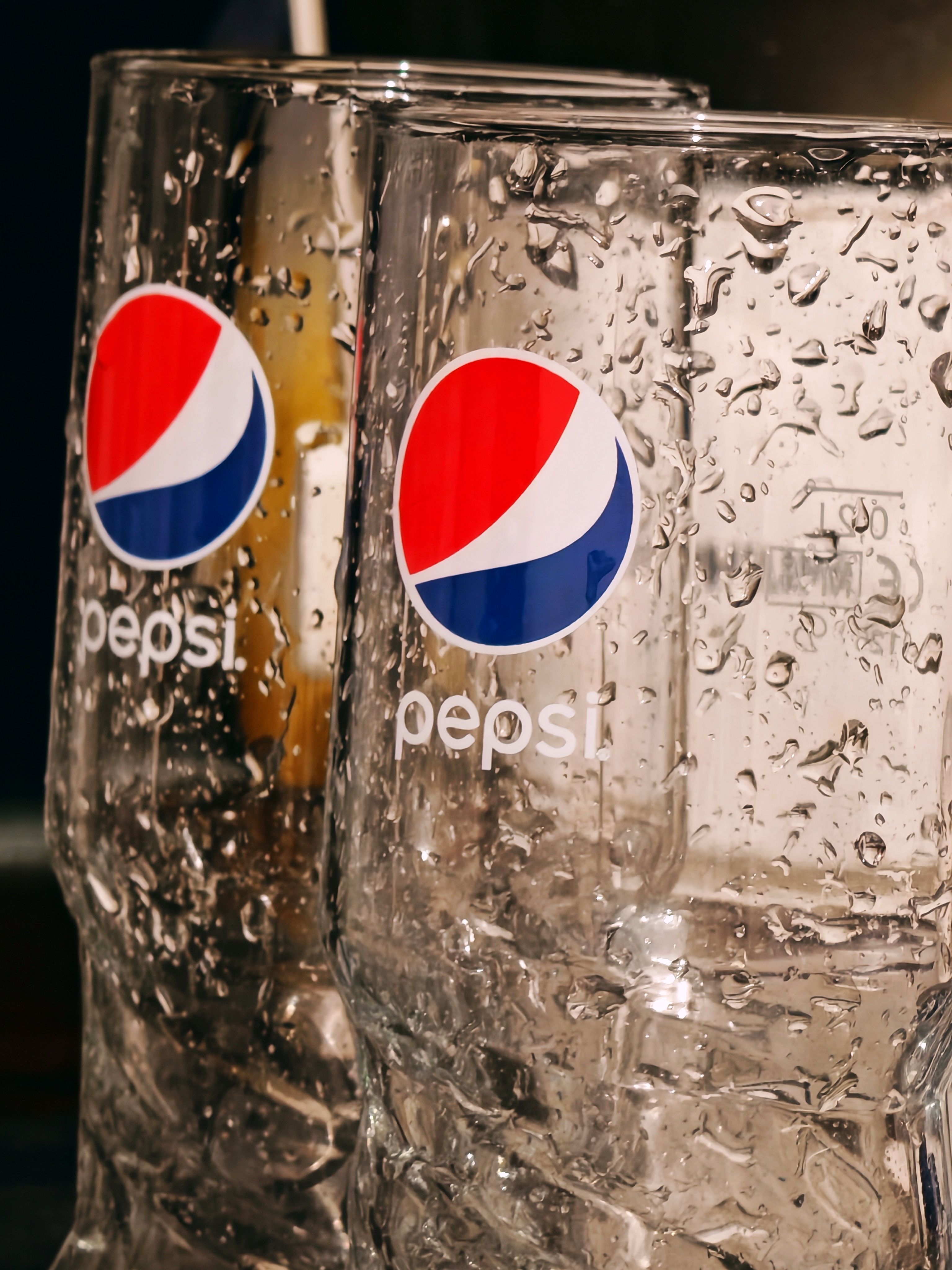 Close-up of Pepsi Glasses with Water Droplets · Free Stock Photo
