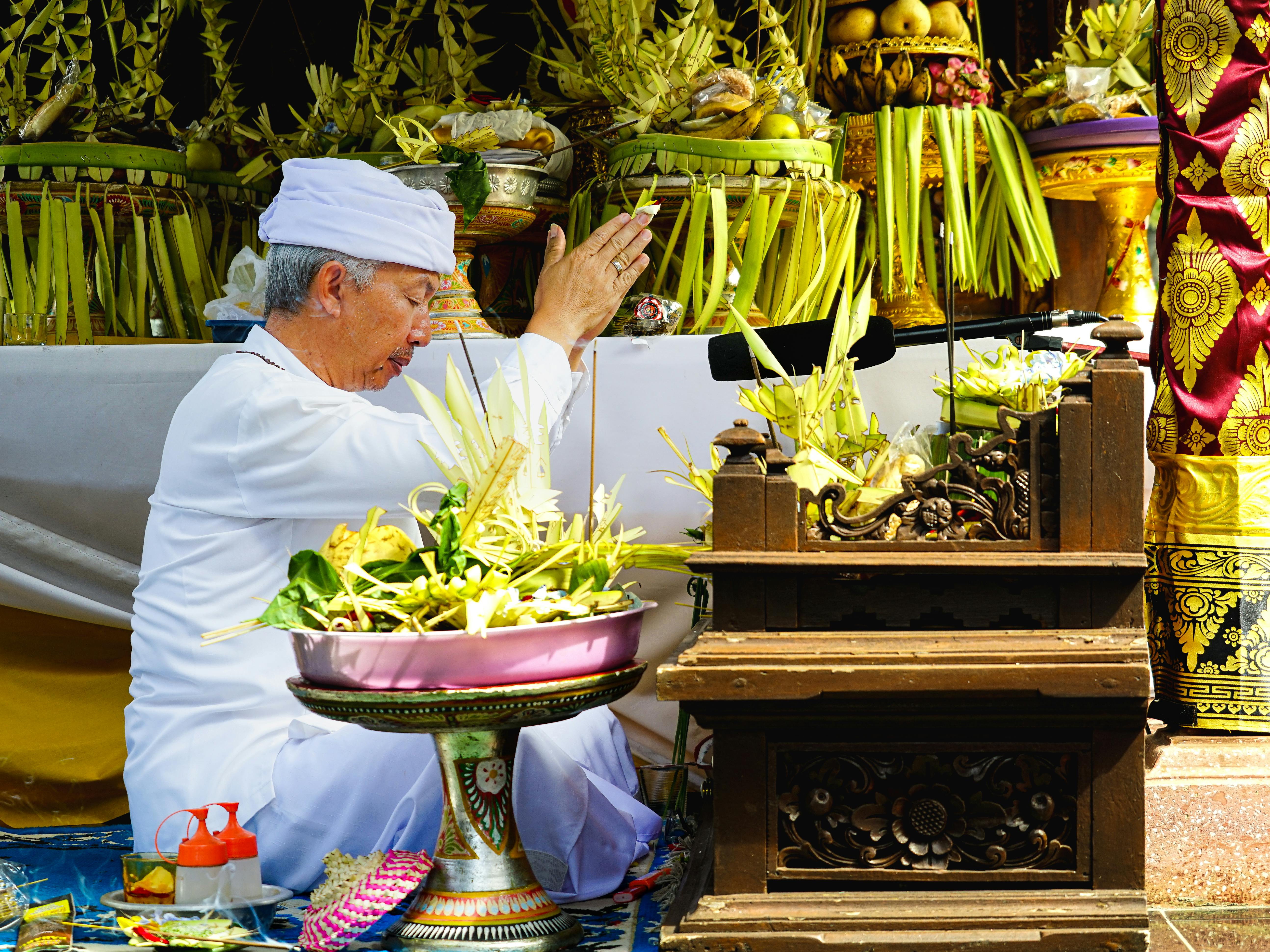 Balinese Man Performing Traditional Ceremony · Free Stock Photo