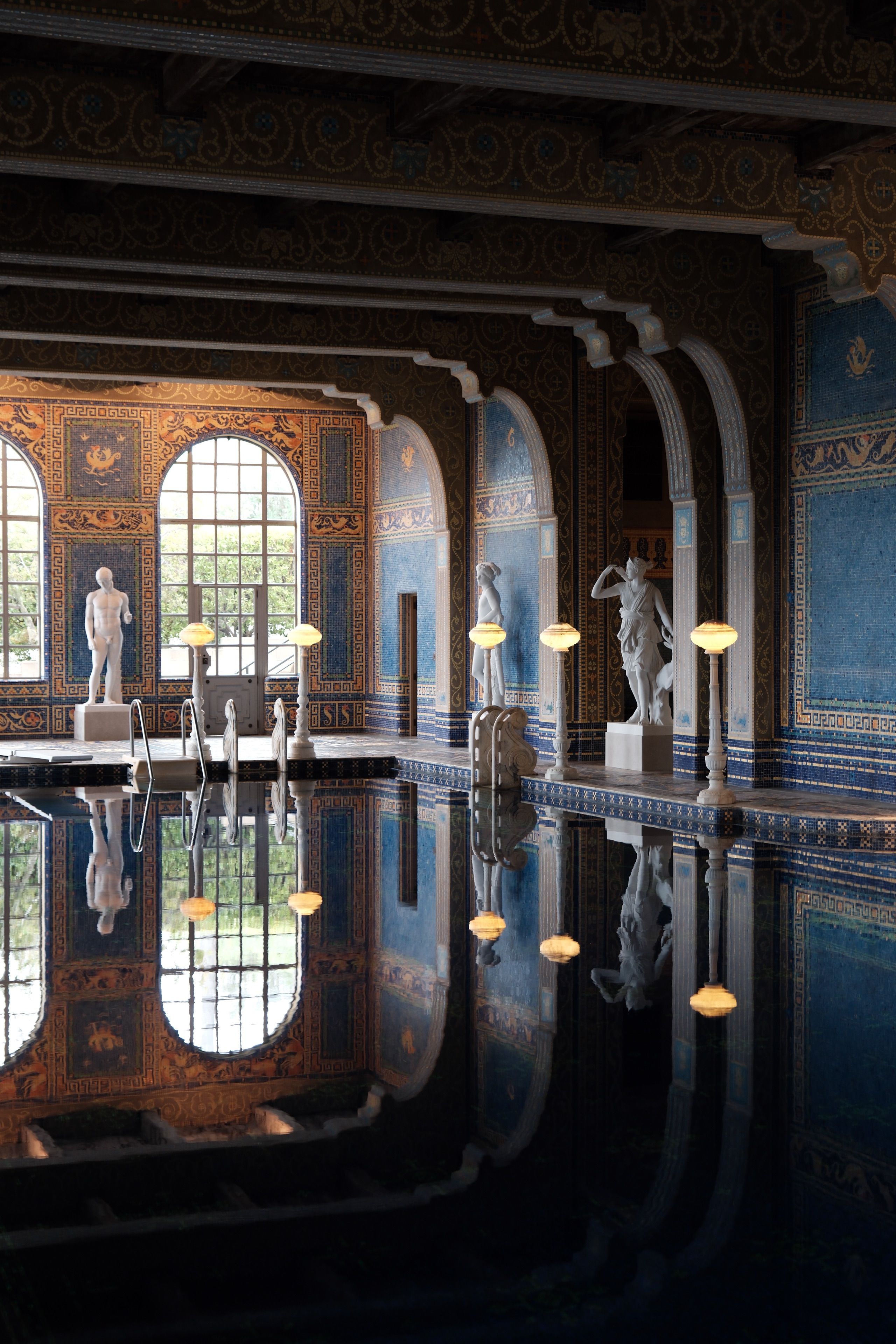 Luxurious Indoor Pool with Classical Statues · Free Stock Photo